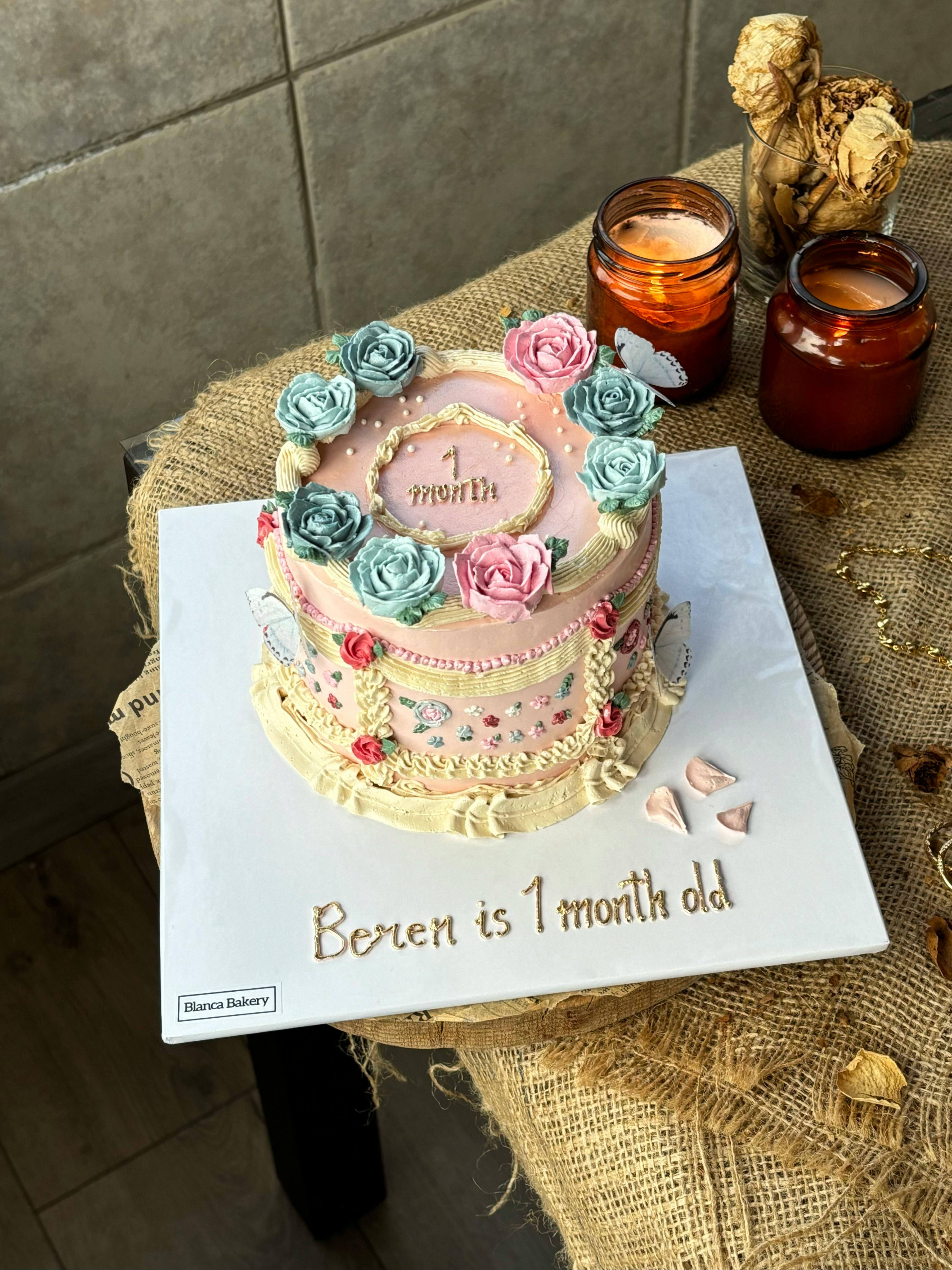 Floral Cake Celebrating One Month Milestone · Free Stock Photo