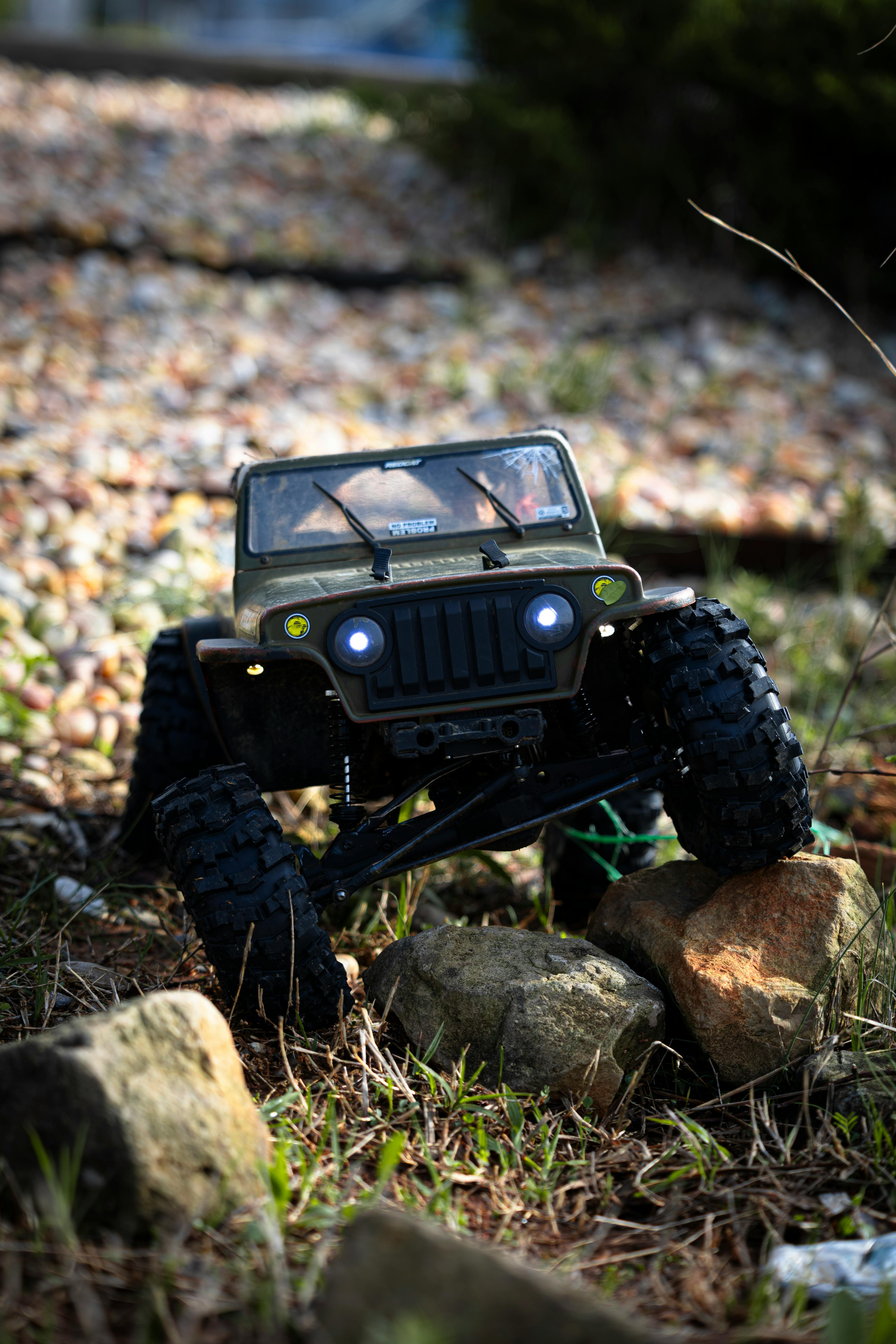 Remote Control Jeep on Rocky Terrain Outdoors · Free Stock Photo