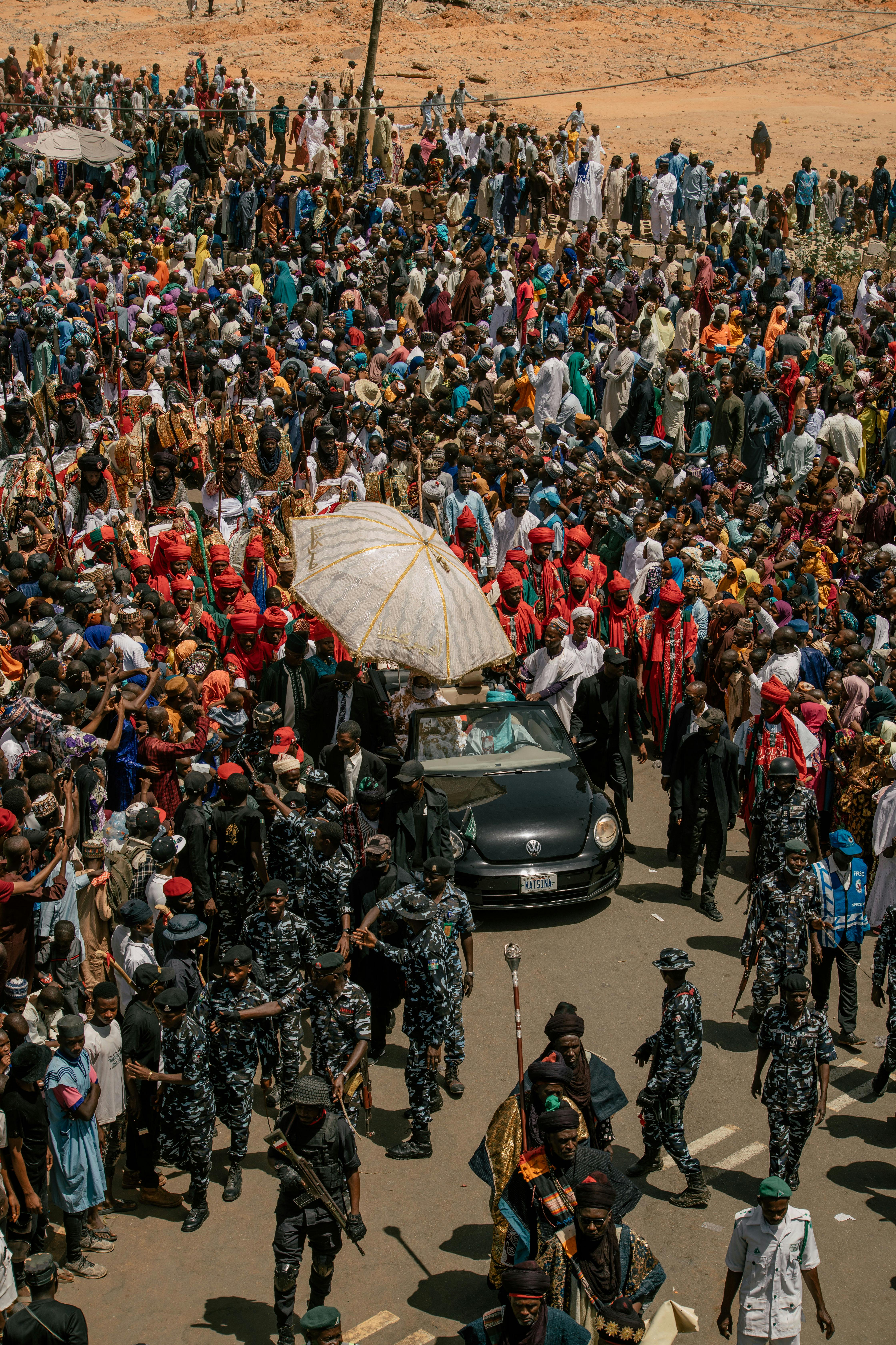 Crowded Parade with Military Presence Seen from Above · Free Stock Photo