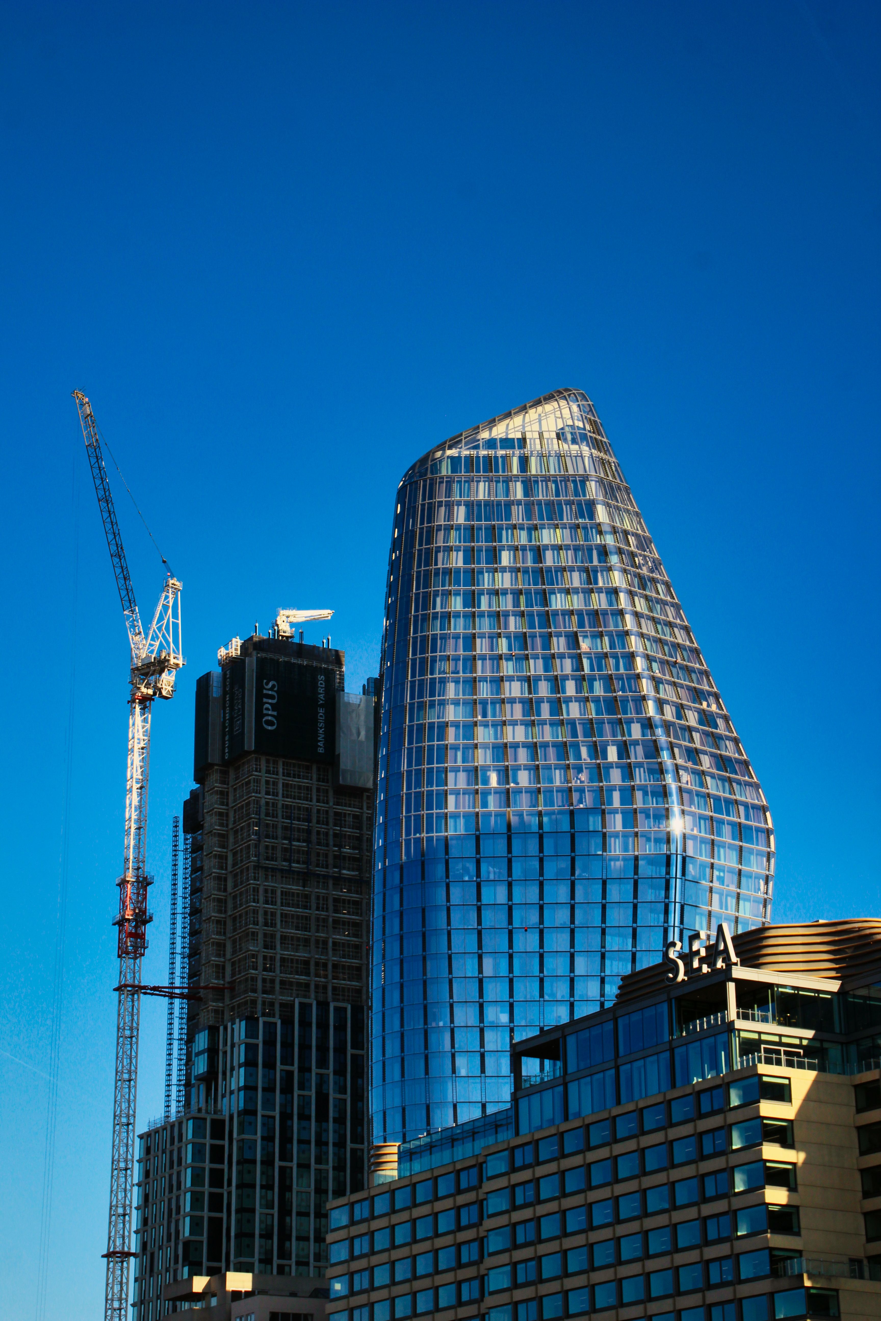 Modern London Skyscrapers Against Blue Sky · Free Stock Photo