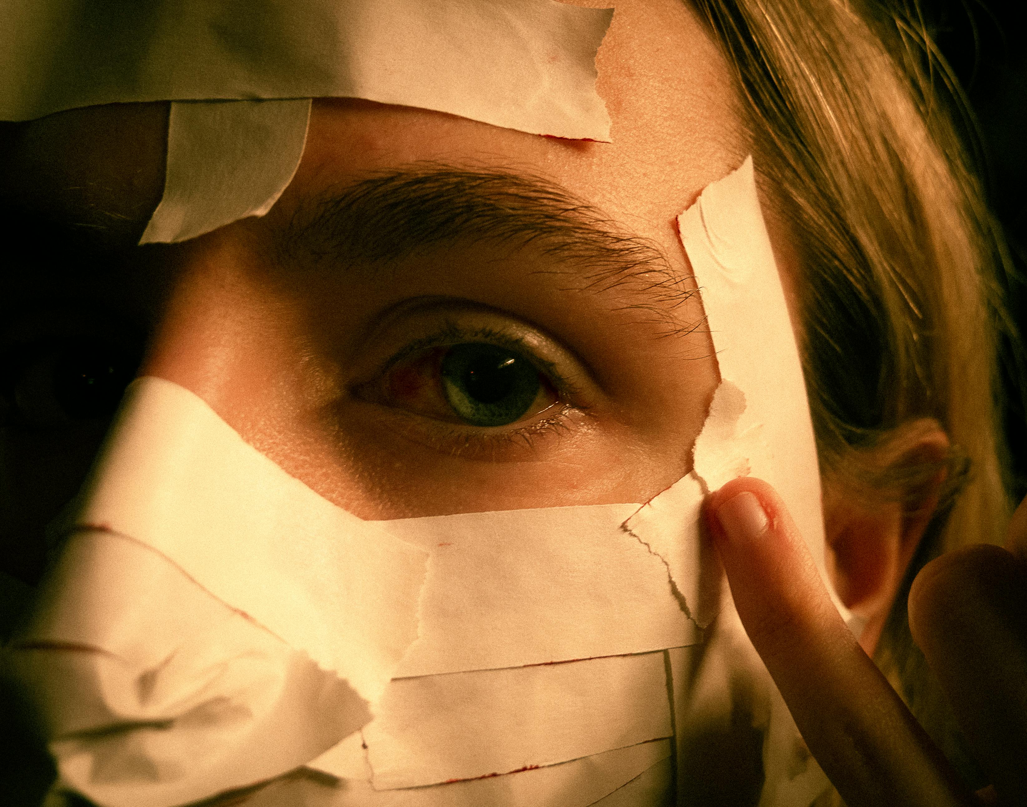 Artistic Portrait with Torn Paper Mask · Free Stock Photo