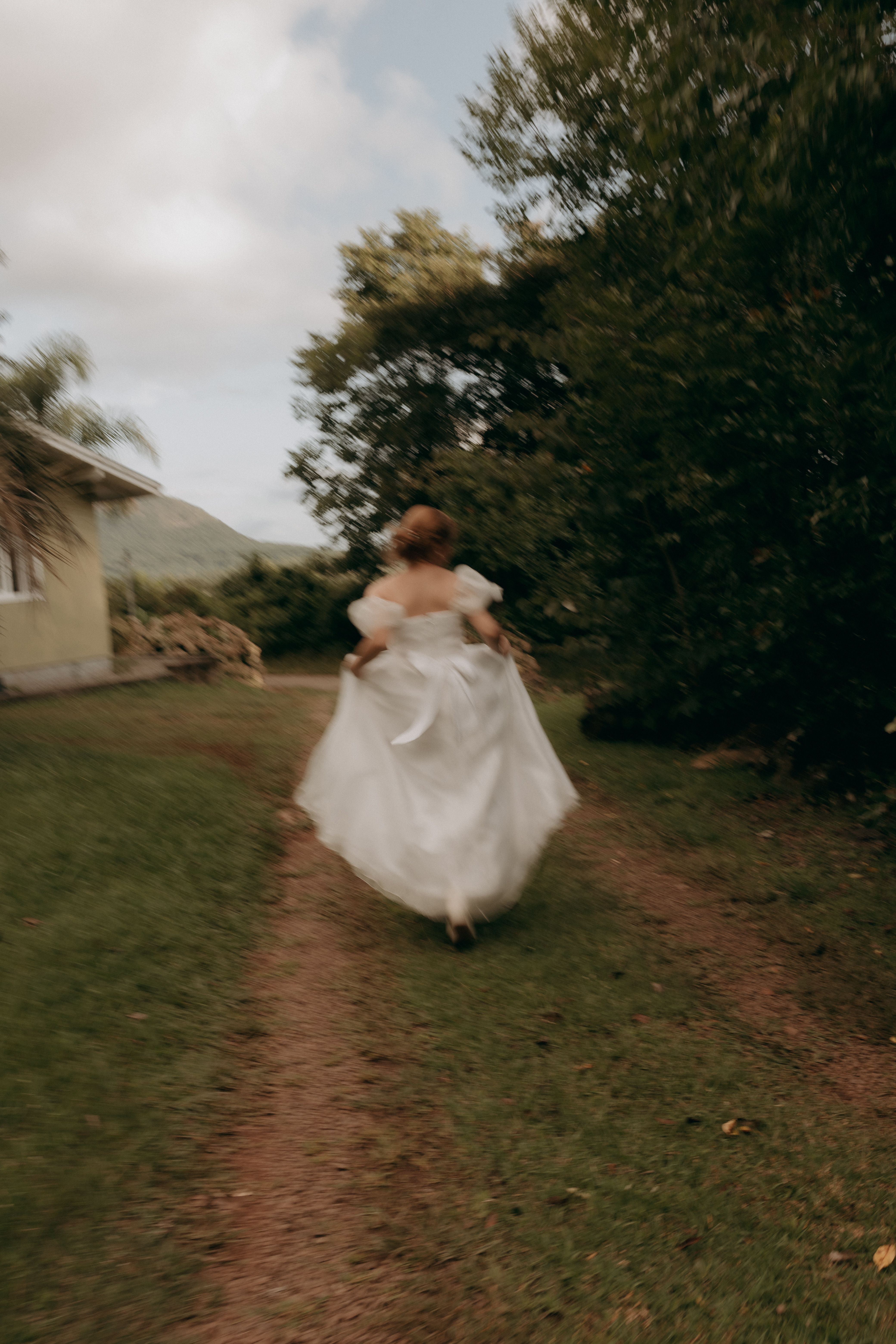 Bride Running Outdoors in Wedding Dress · Free Stock Photo