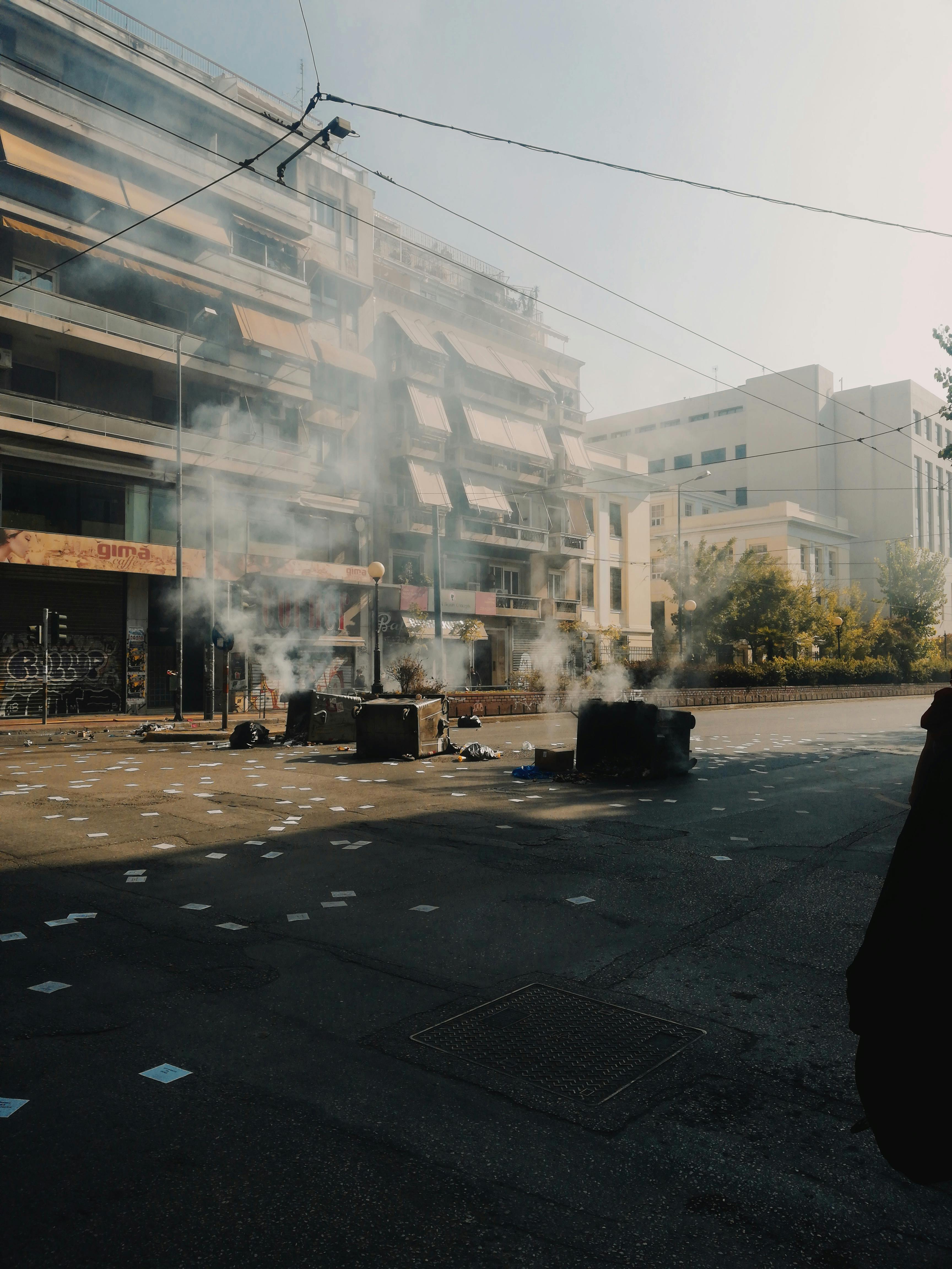 Smoke in front of Buildings · Free Stock Photo