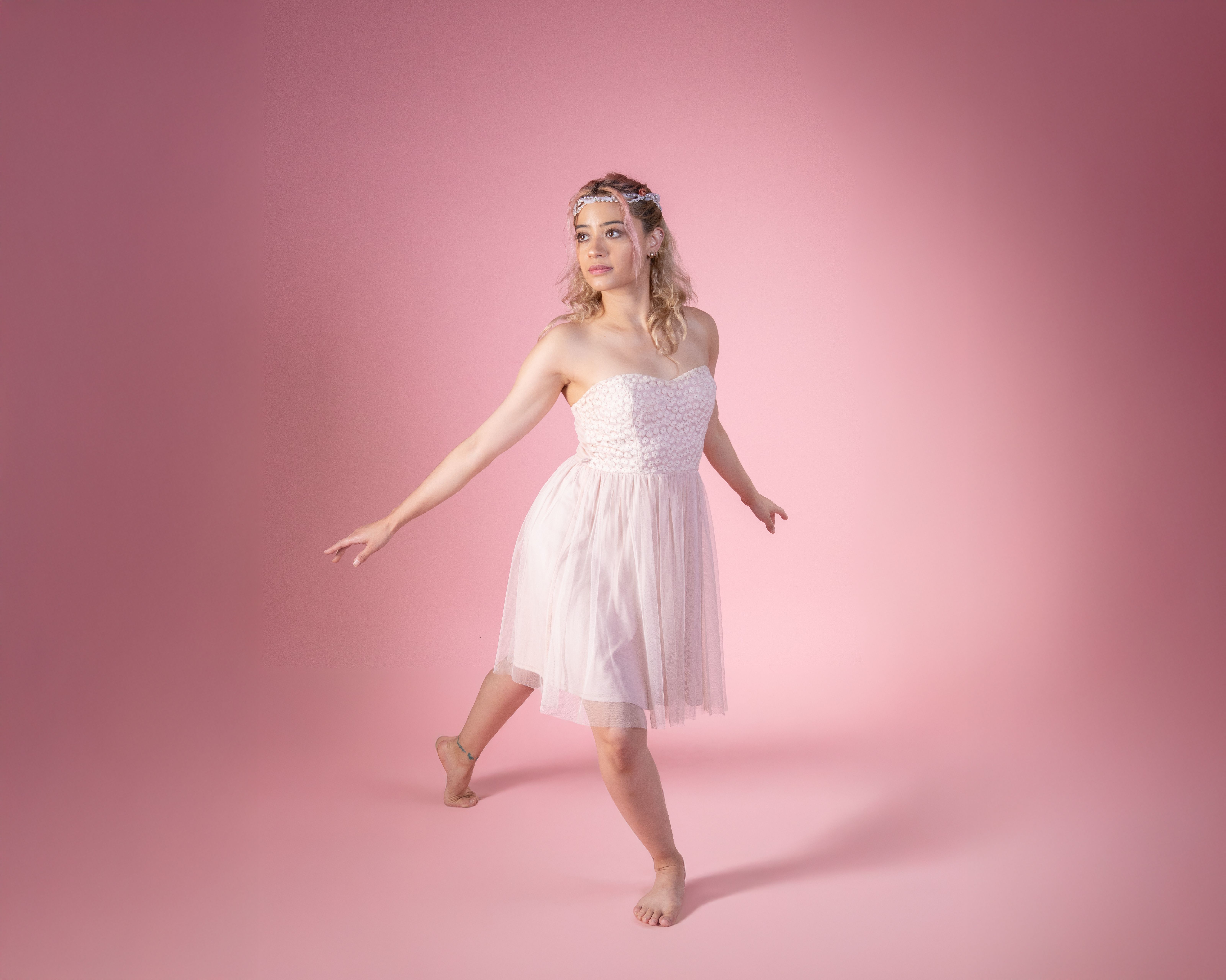 Elegant Ballet Dancer in Pastel Pink Dress · Free Stock Photo