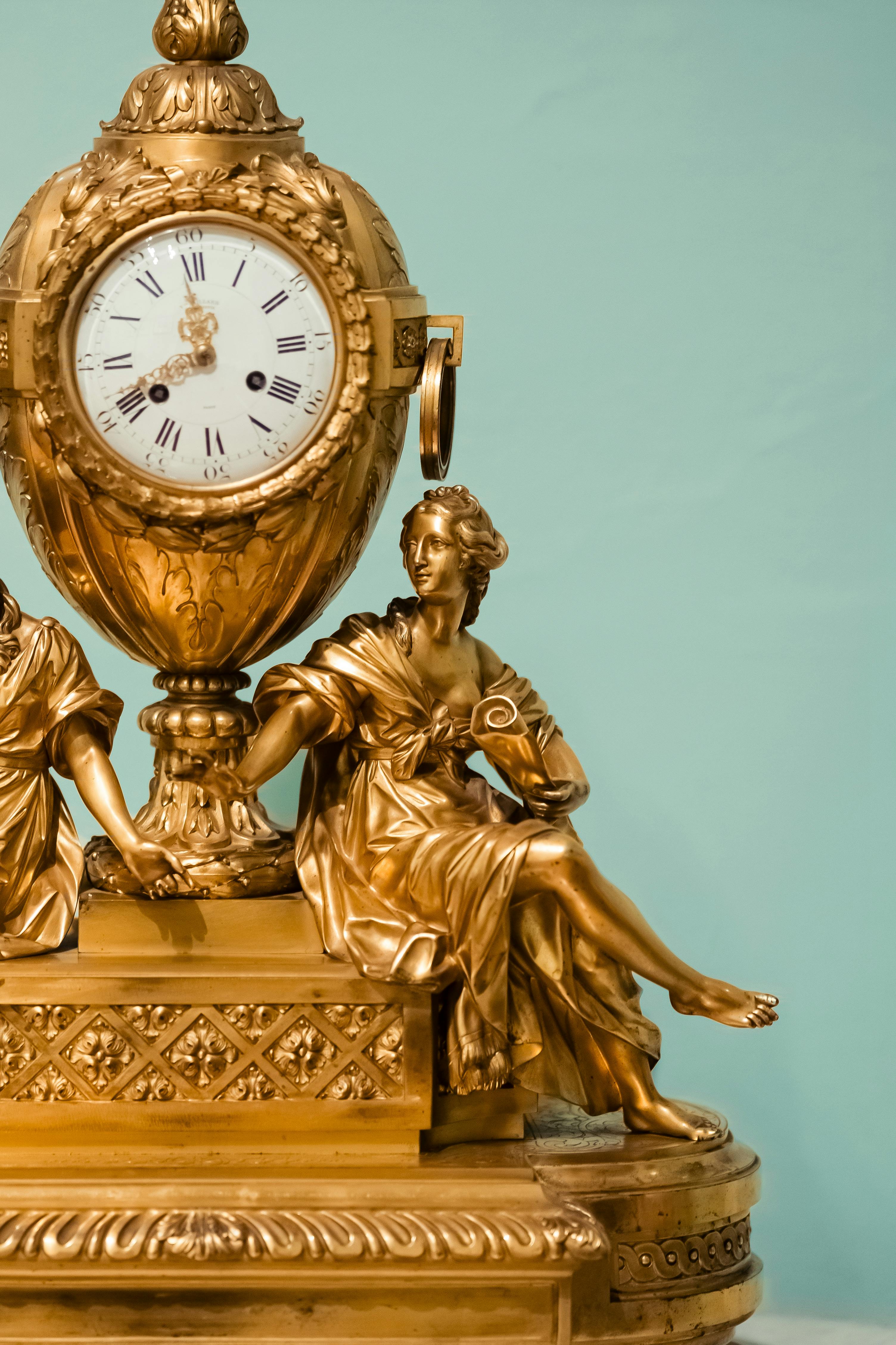 Luxurious Antique Gold Clock with Sculptures · Free Stock Photo