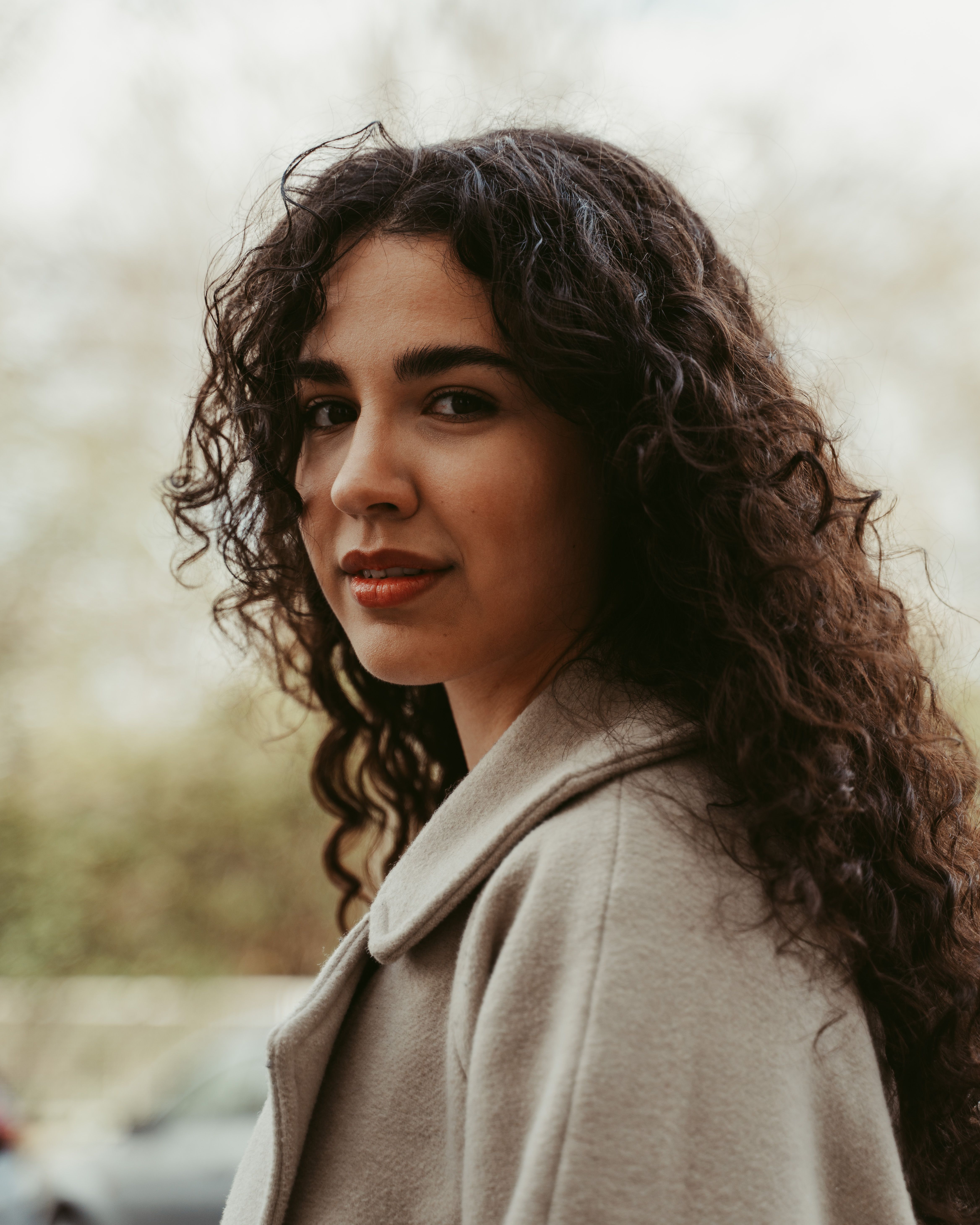 Warm Outdoor Portrait of Woman in Berlin · Free Stock Photo
