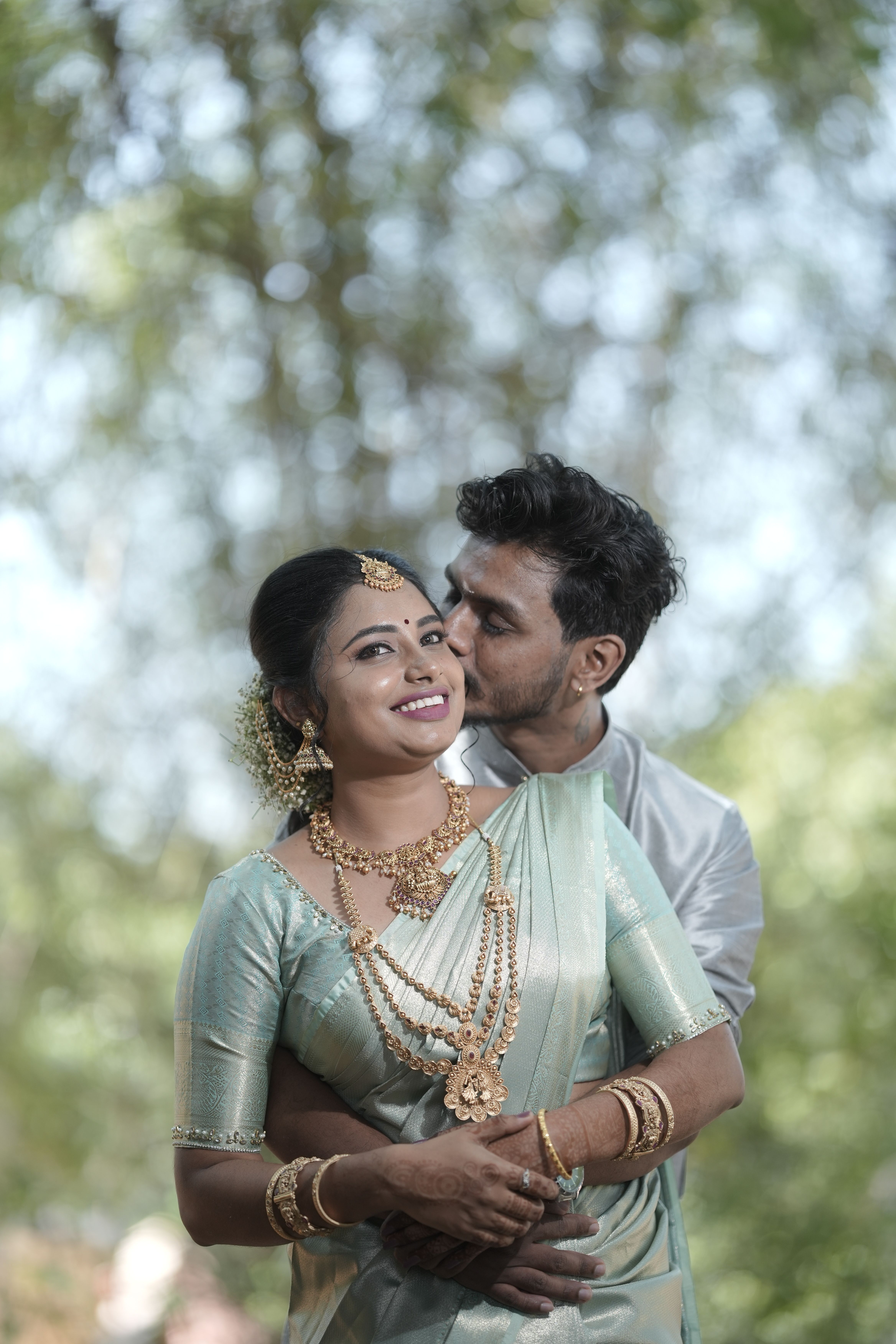 Romantic Outdoor Engagement Photo in Elegant Attire · Free Stock Photo