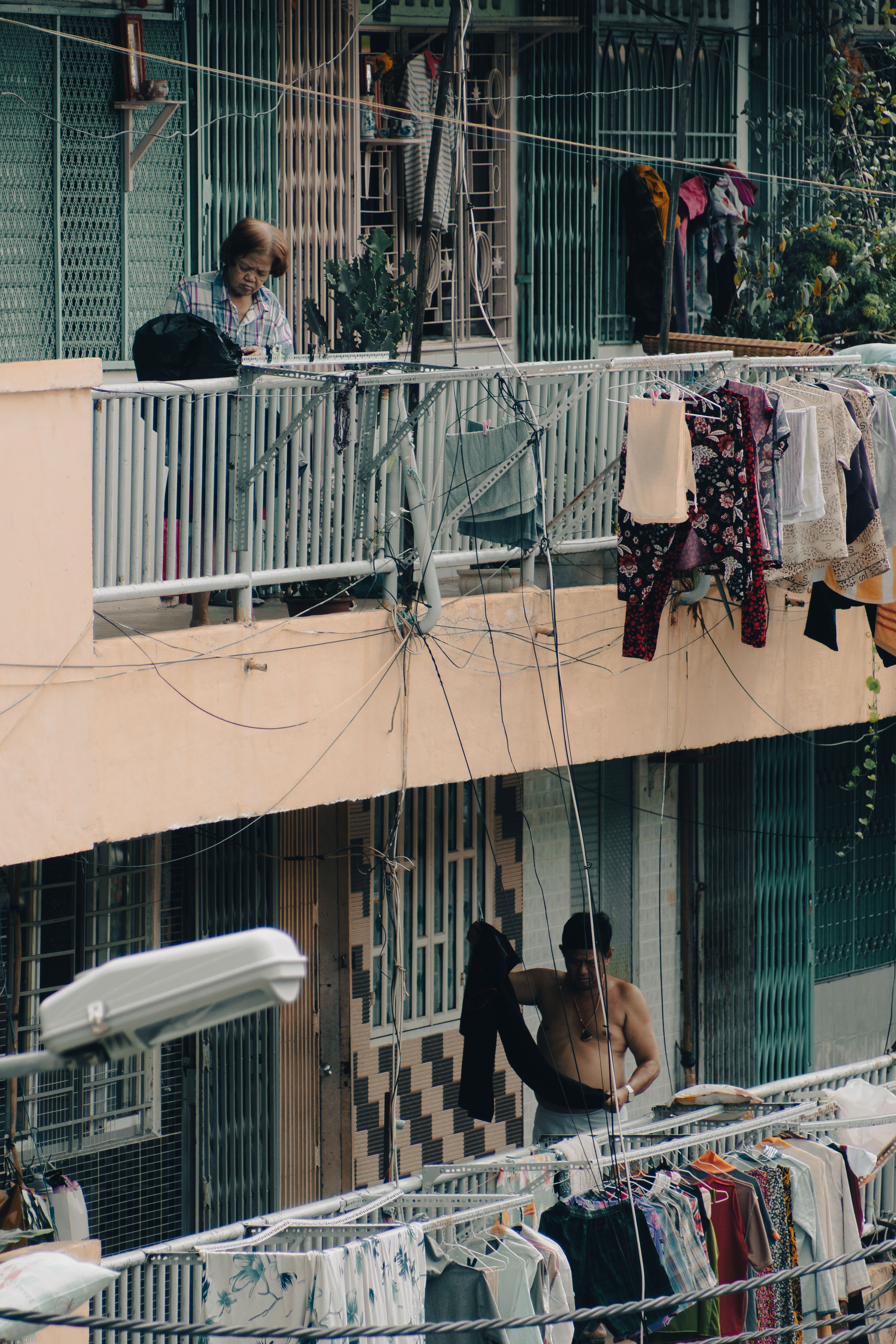 Daily Life on a Vietnamese Balcony Scene · Free Stock Photo