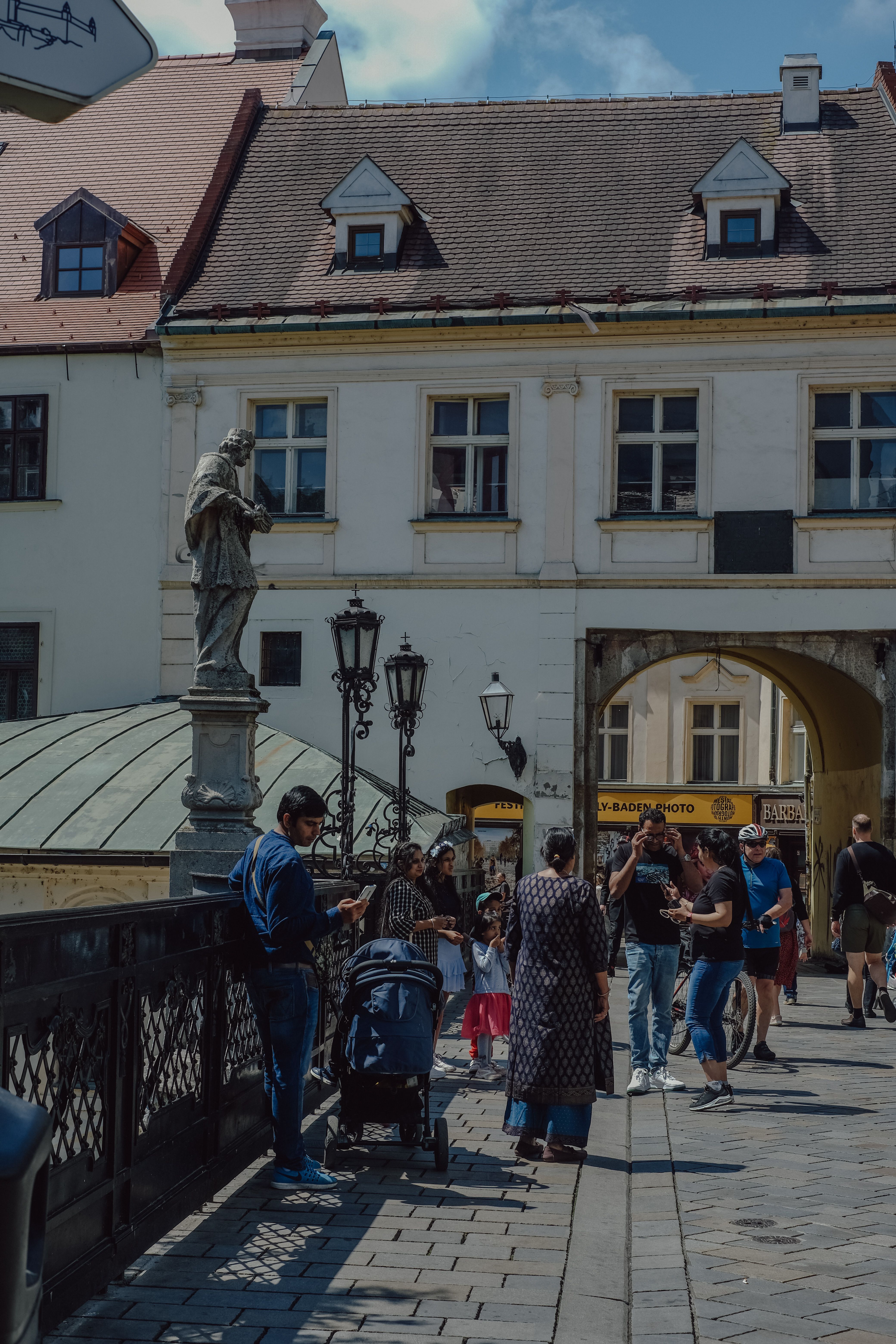 Historic European Street with Tourists · Free Stock Photo