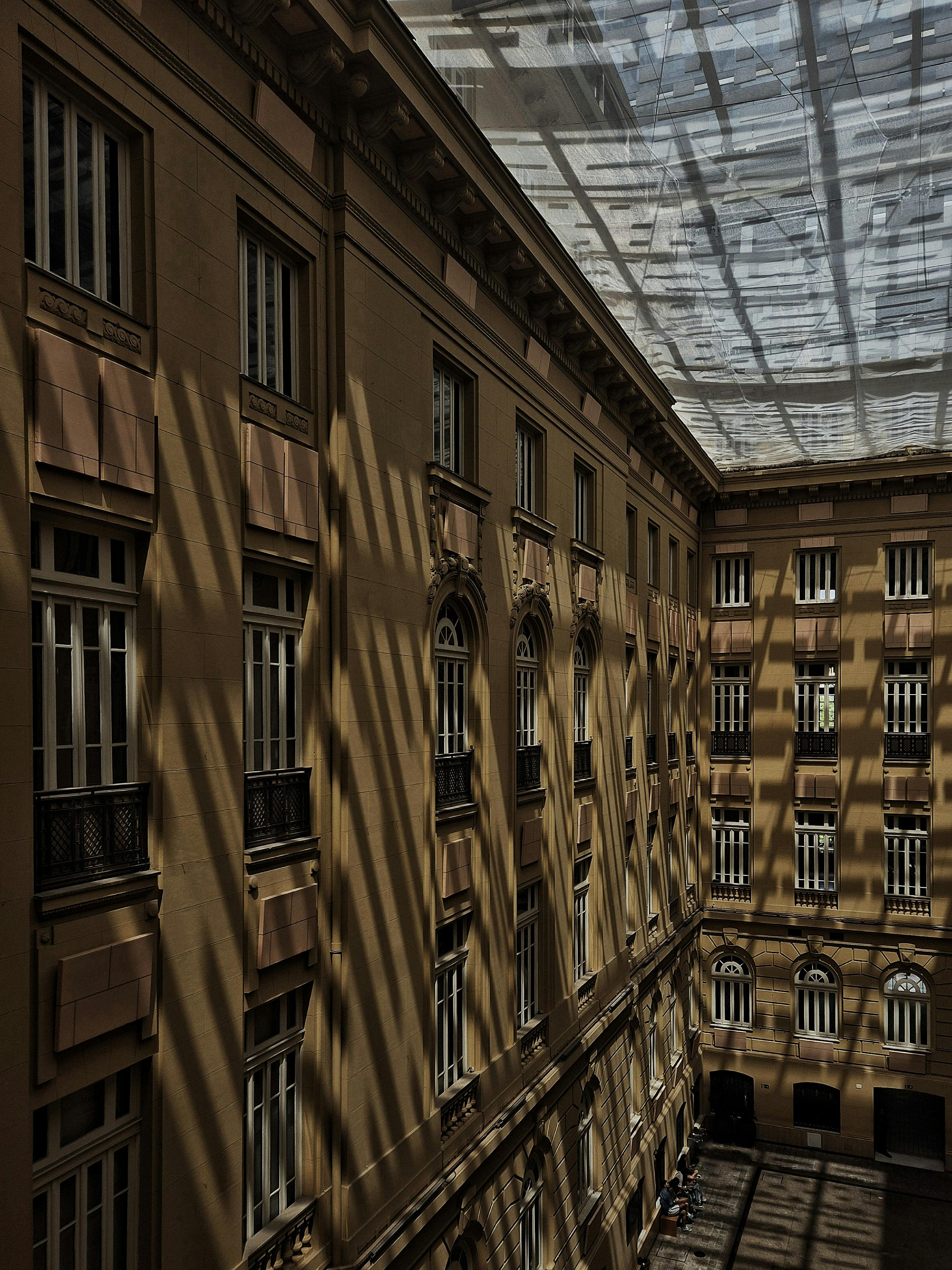 Dramatic Shadows in Historic Indoor Atrium · Free Stock Photo