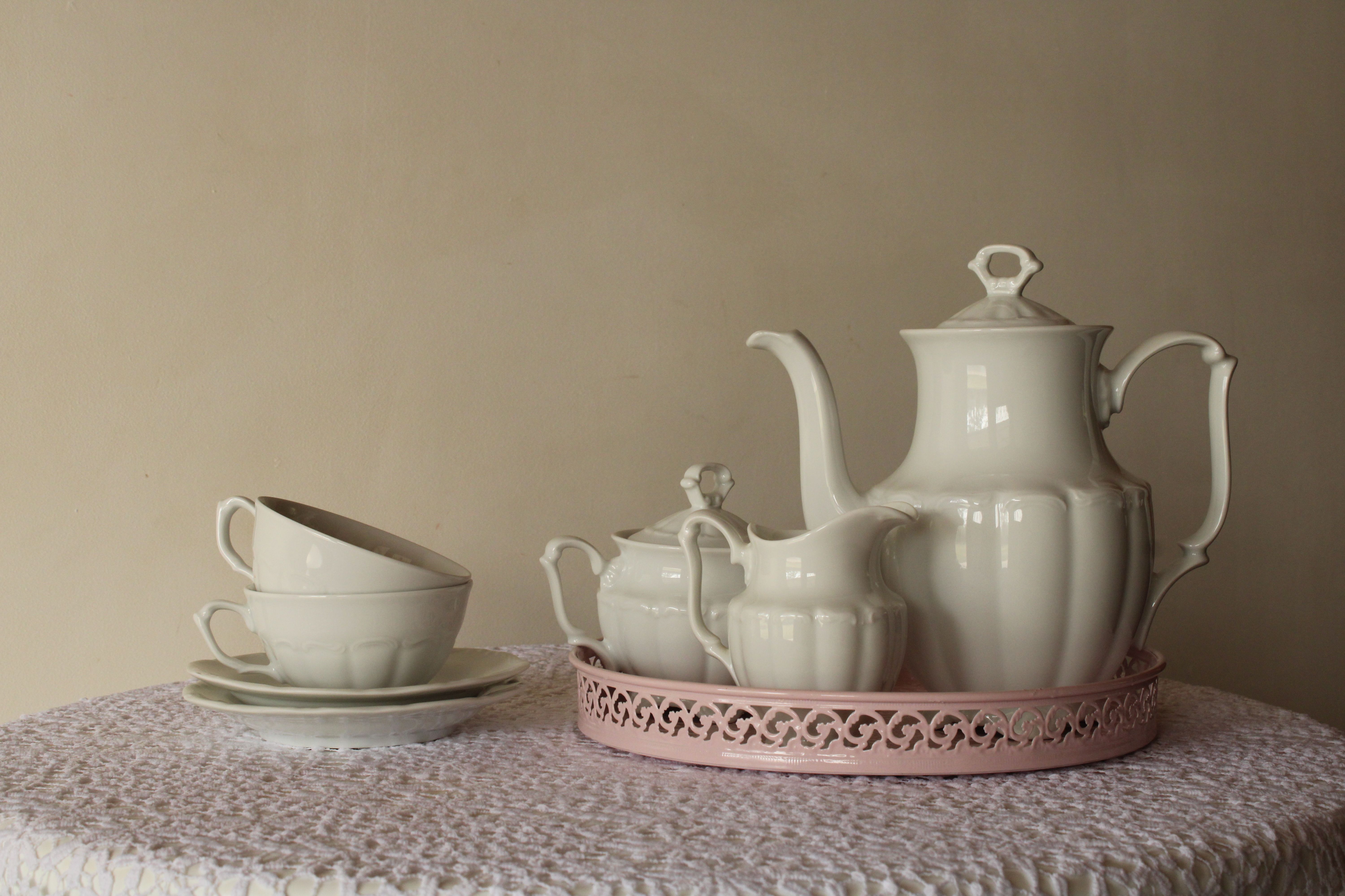 Elegant Porcelain Tea Set on Lace Tablecloth · Free Stock Photo