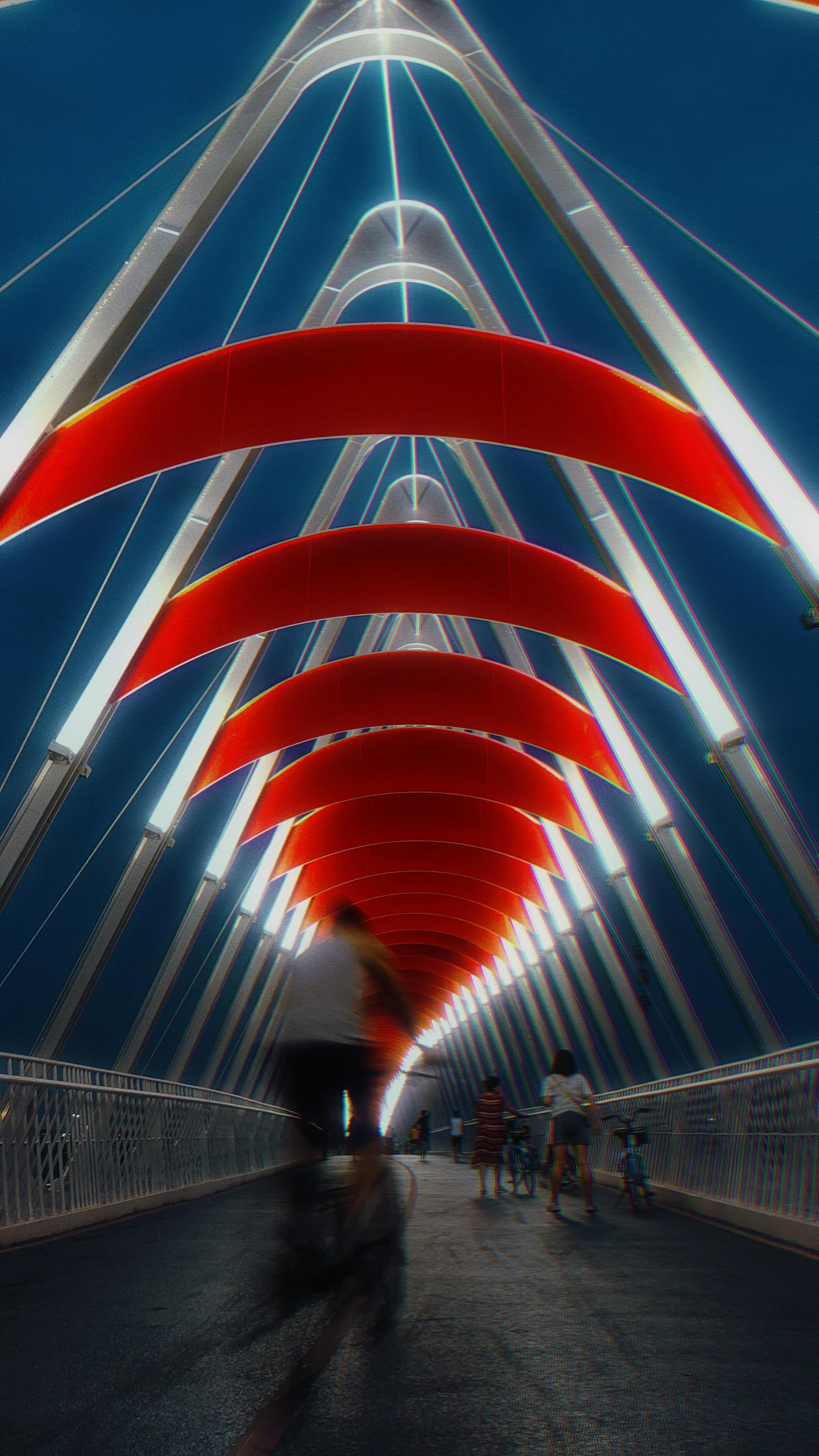 Modern Arch Bridge with Dynamic Lighting at Night · Free Stock Photo