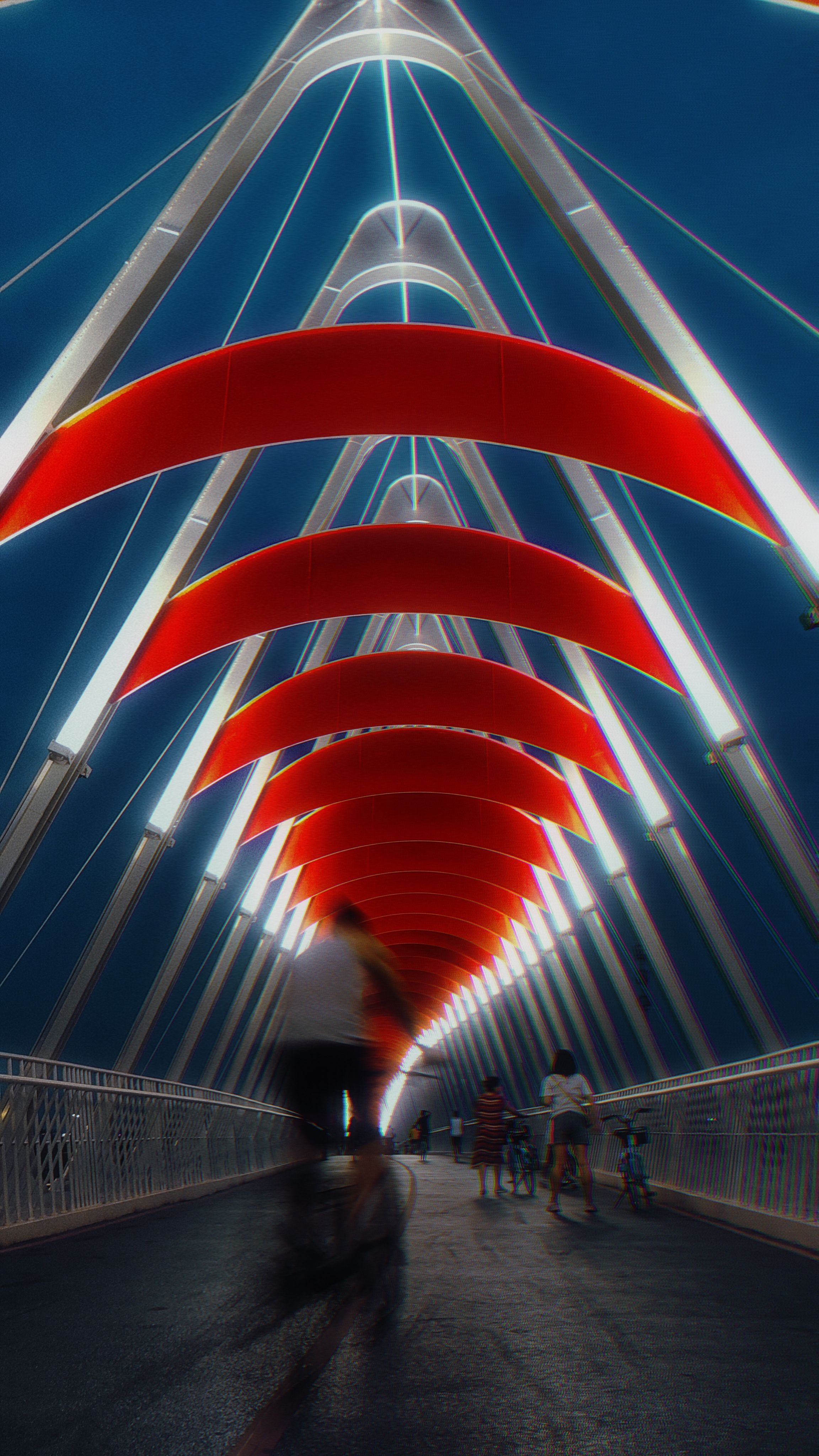 Modern Arch Bridge with Dynamic Lighting at Night · Free Stock Photo