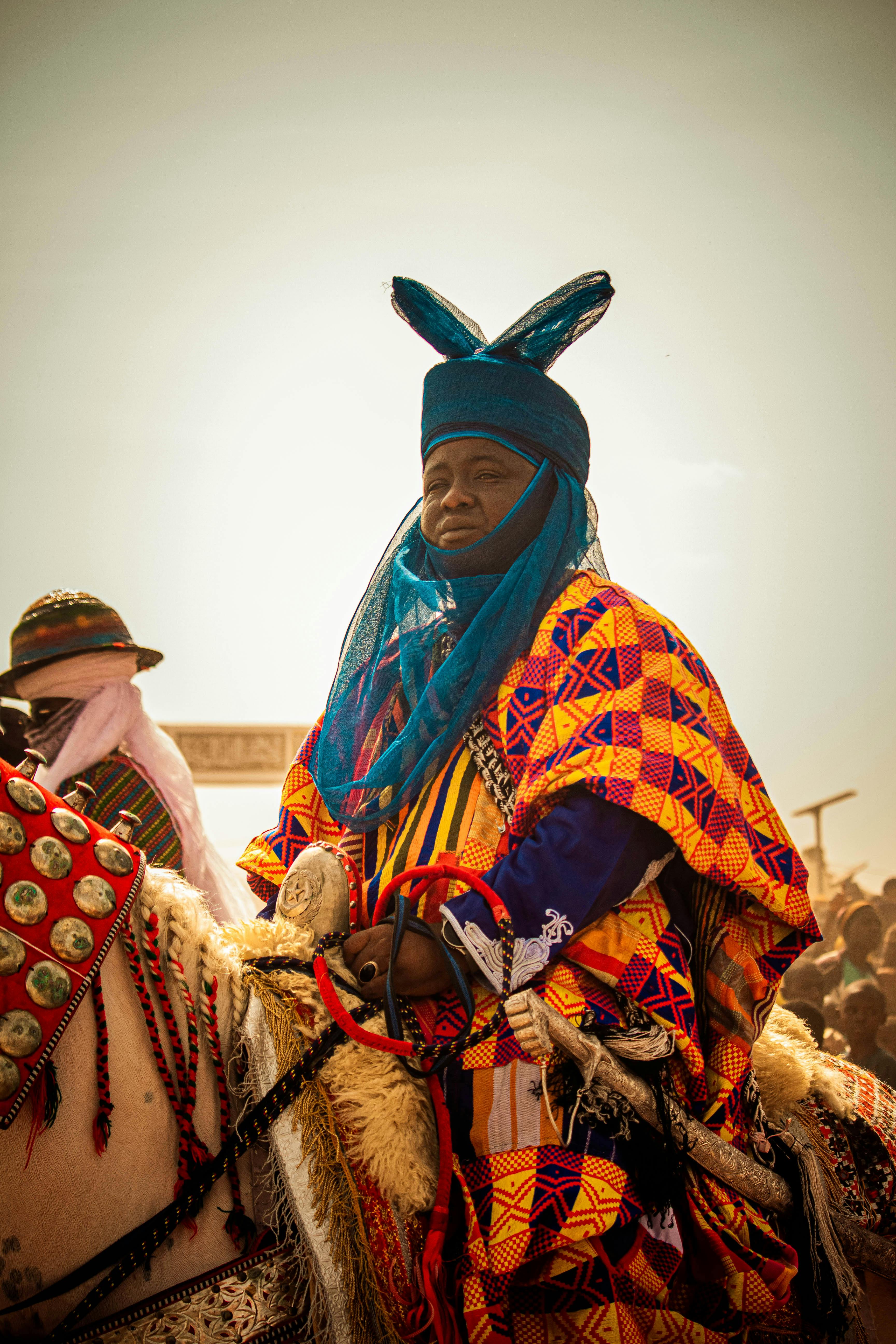 Colorful African Horse Rider at Cultural Festival · Free Stock Photo