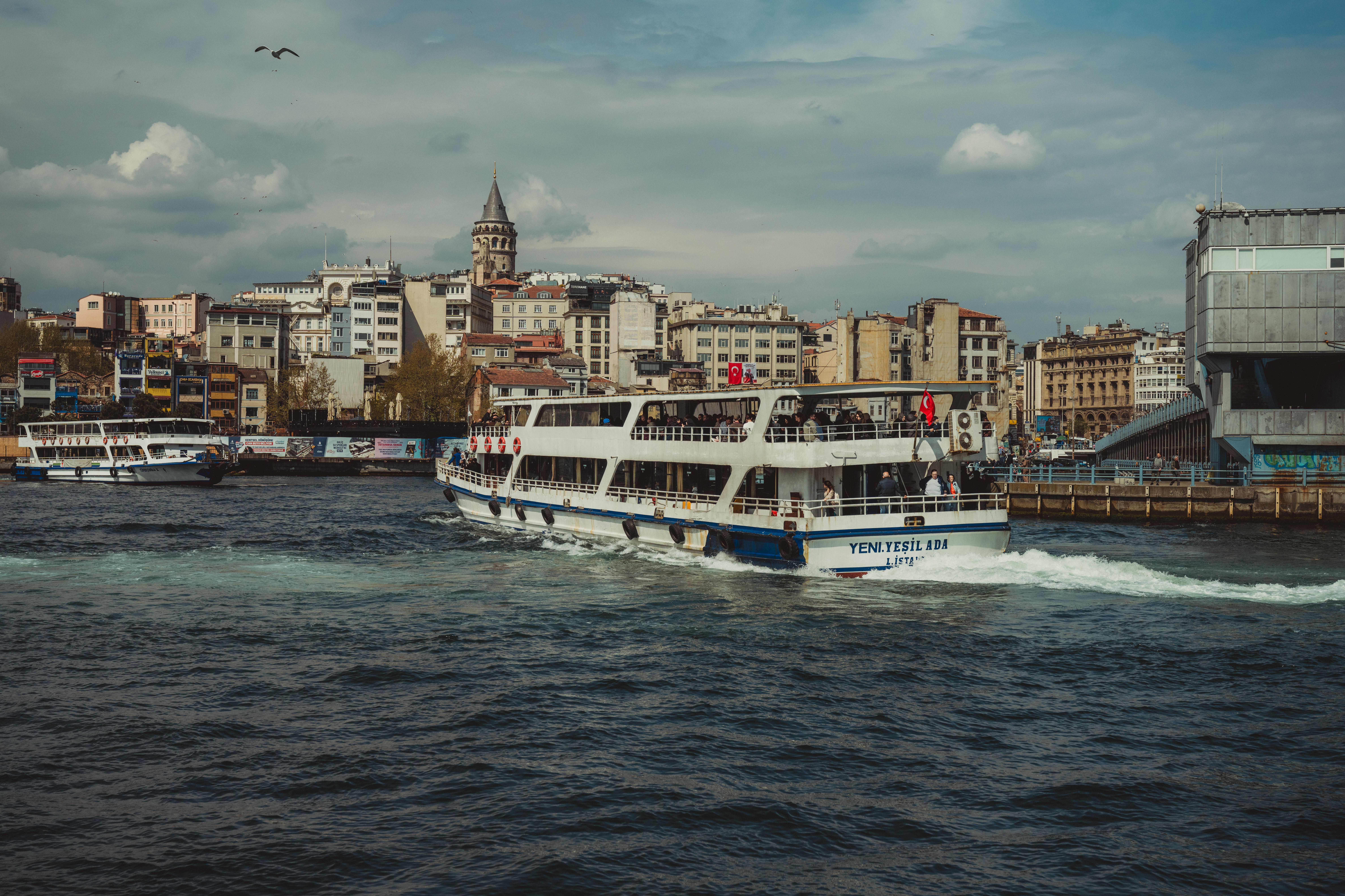 Historic Ferry Crossing with Galata Tower View · Free Stock Photo