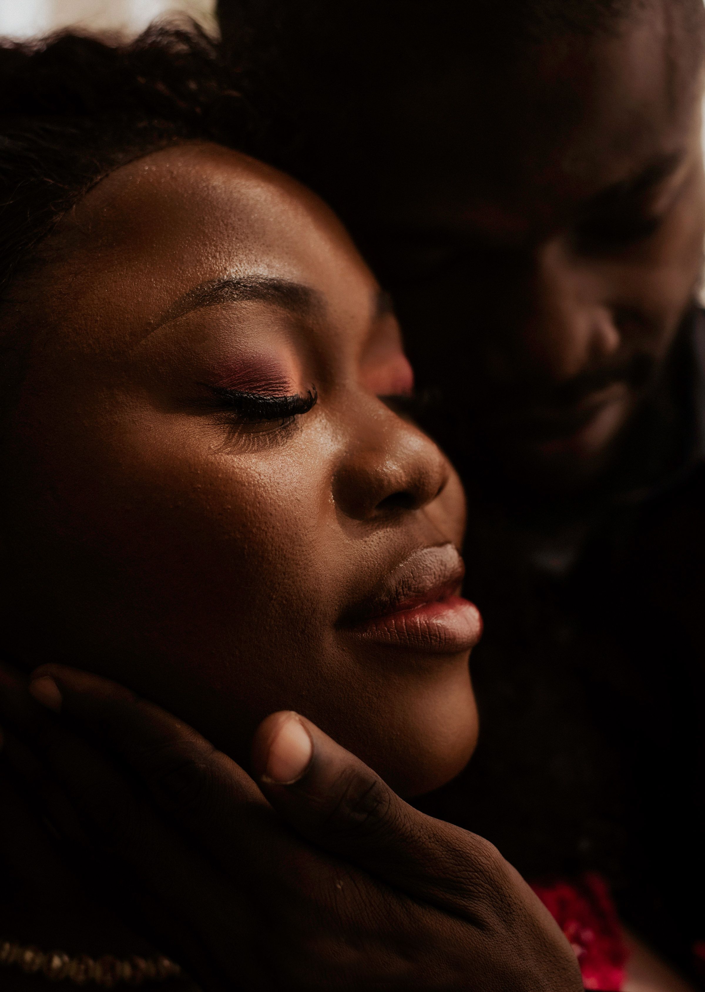 Intimate Close-Up of a Tender Moment Between Two Adults · Free Stock Photo