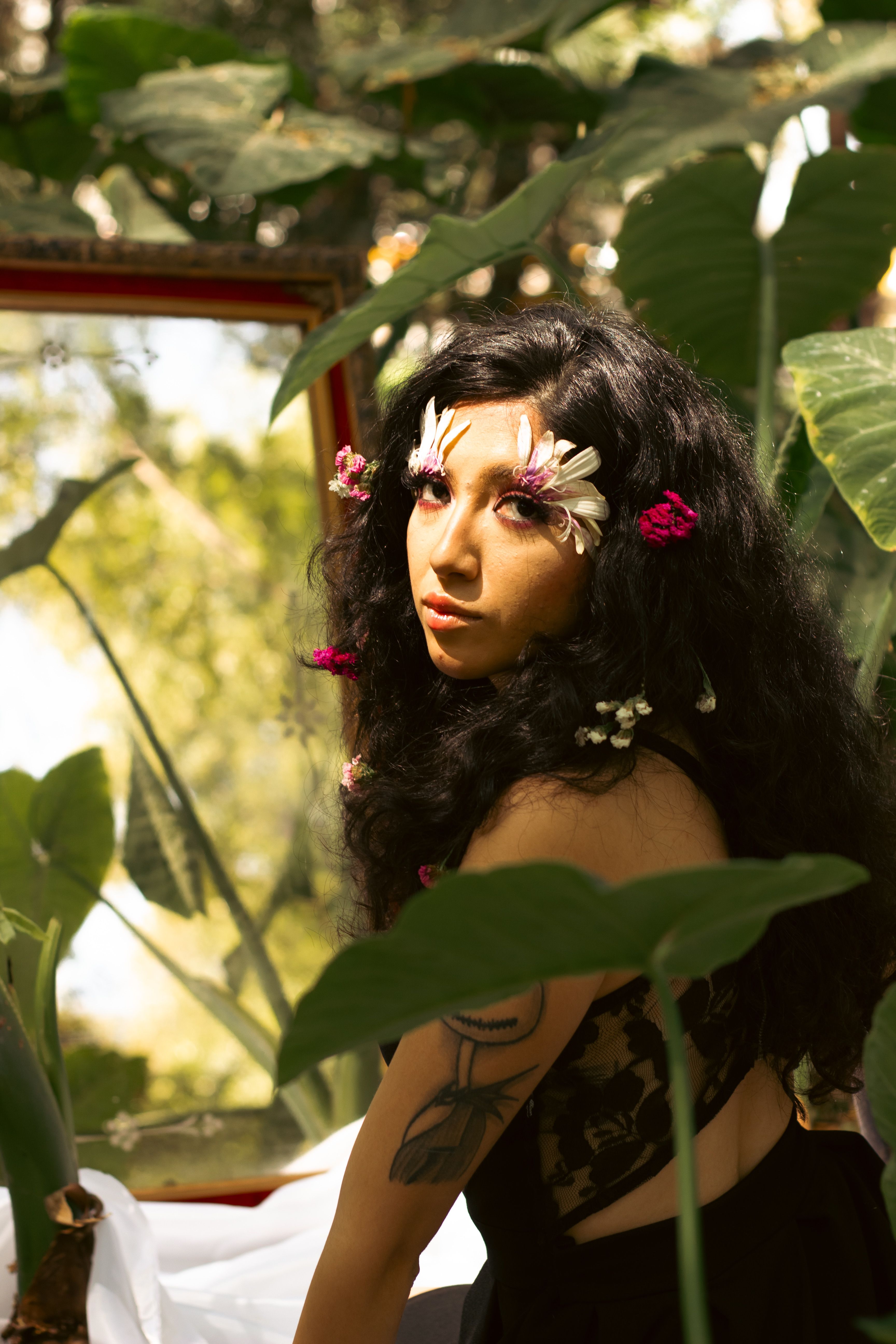 Enchanted Woman in Lush Greenery Fashion Shoot · Free Stock Photo