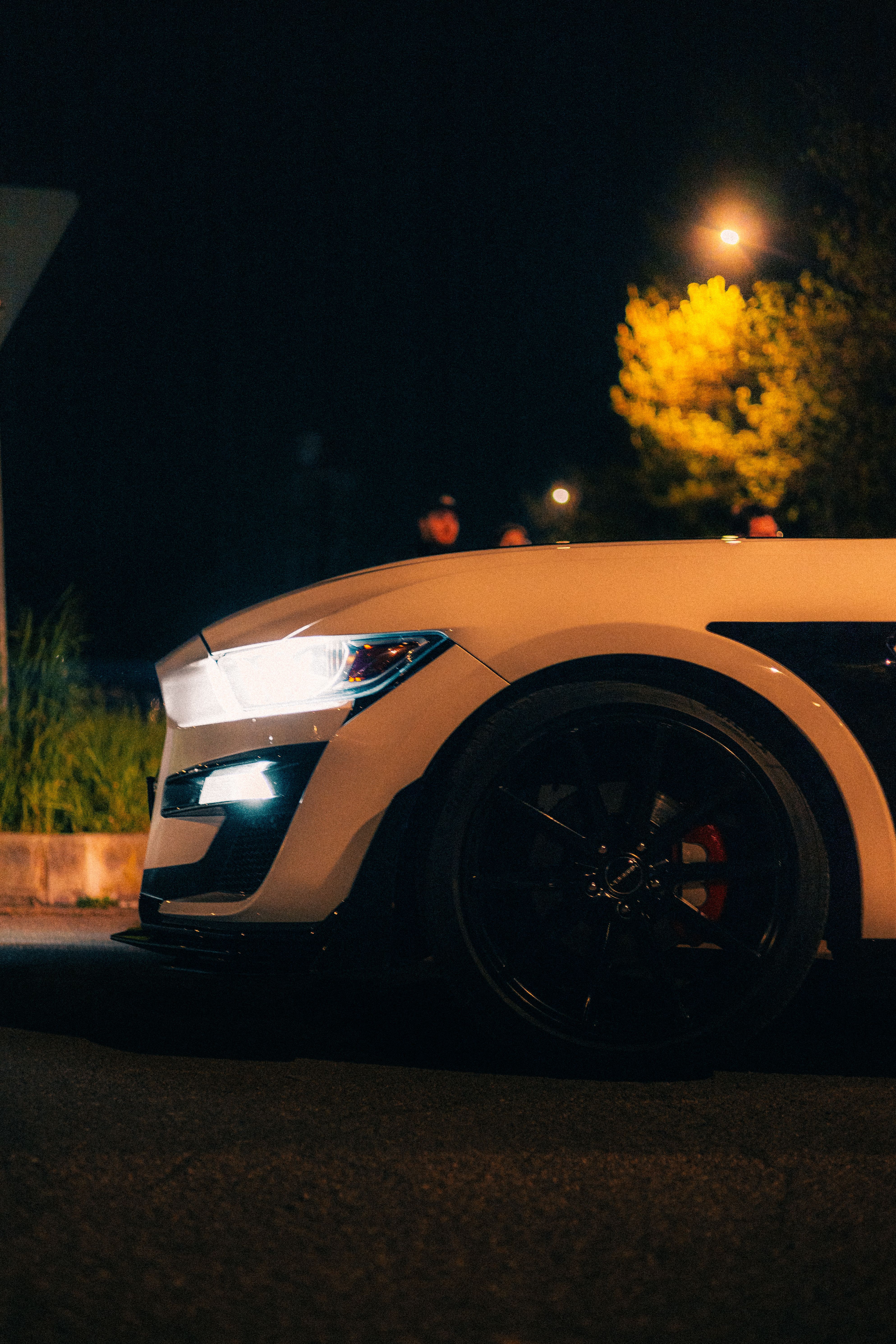 Sleek White Sports Car at Night · Free Stock Photo