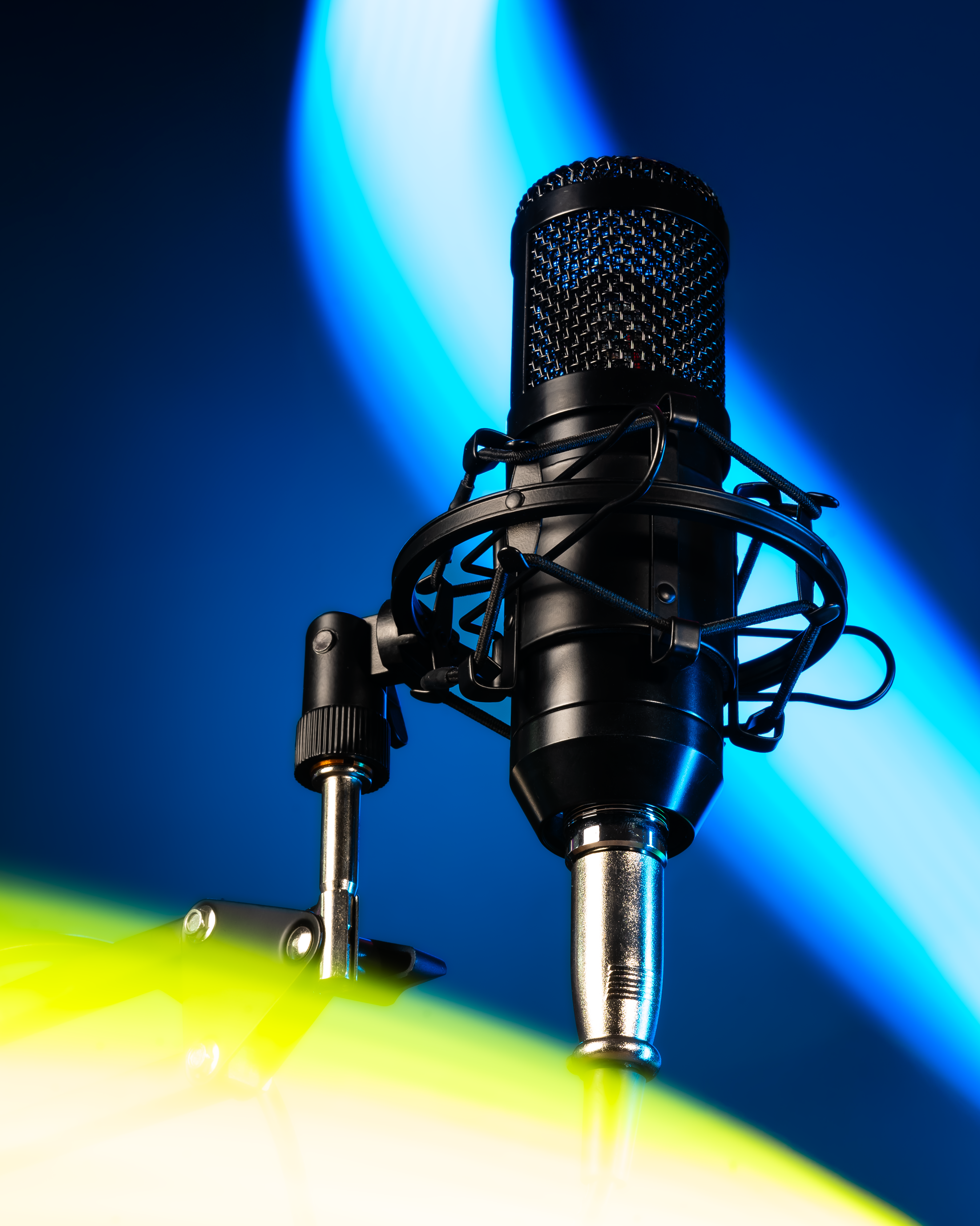 Professional Microphone with Vibrant Lighting · Free Stock Photo