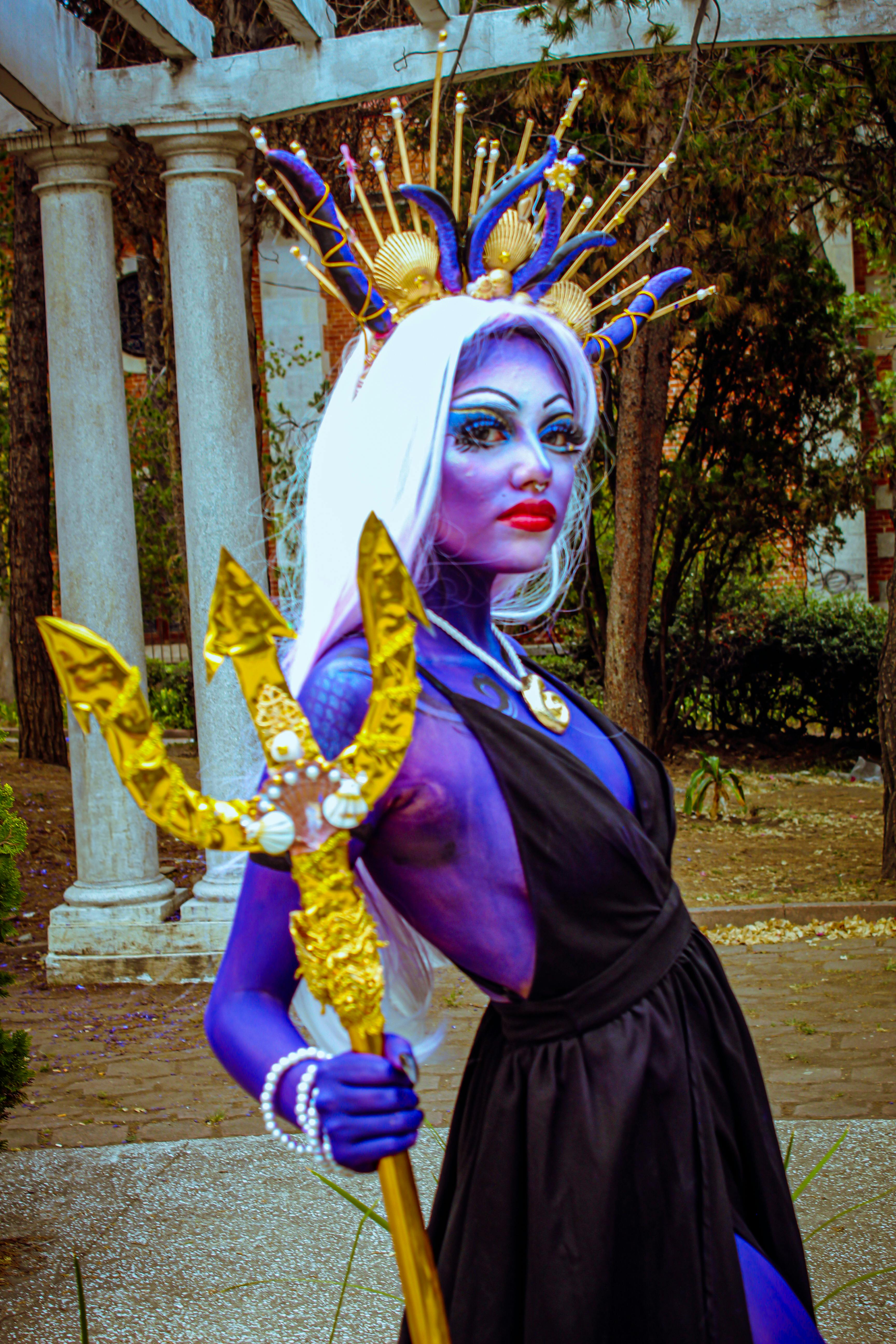 Fantasy Cosplay with Purple Headdress and Trident · Free Stock Photo