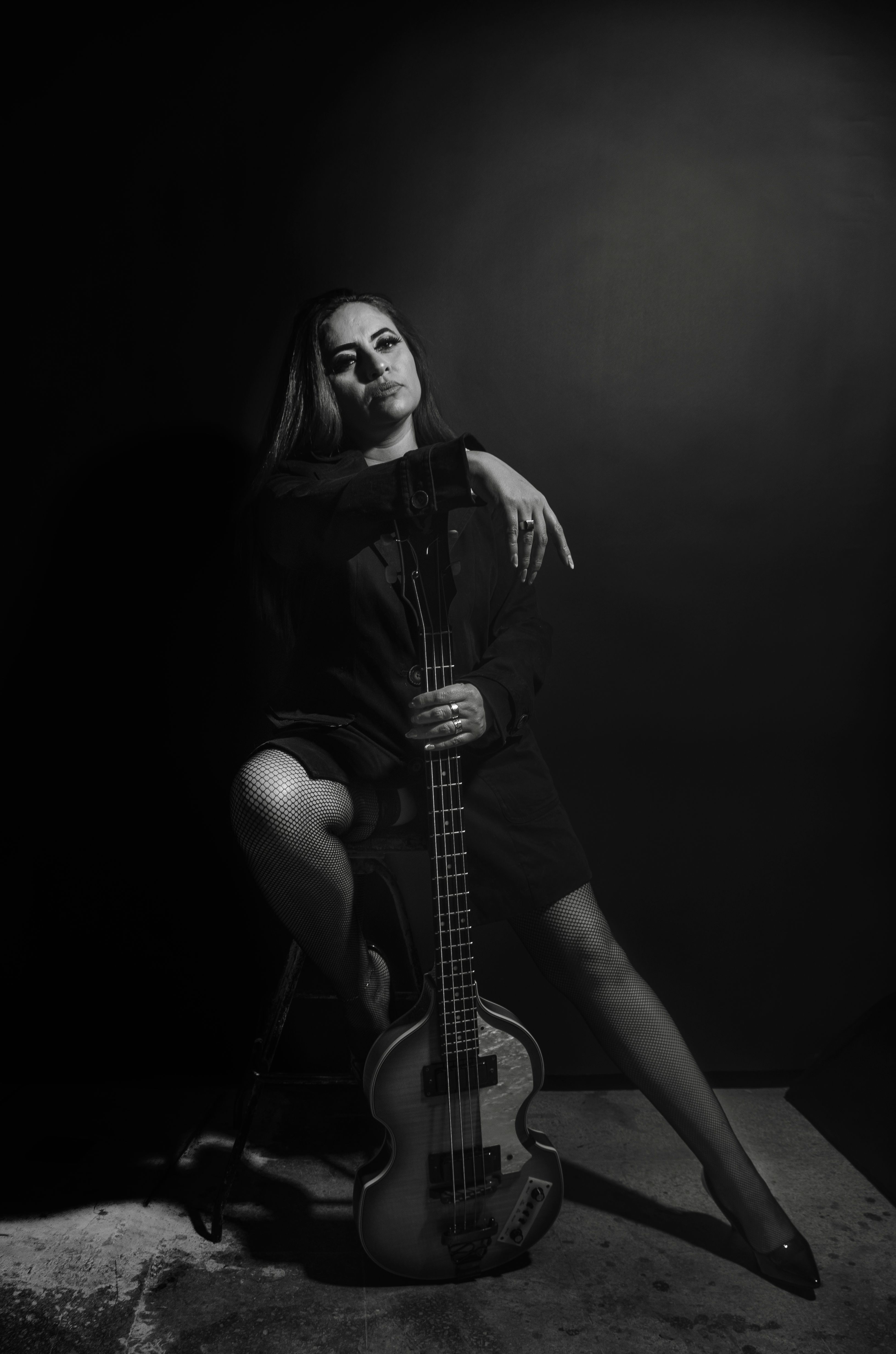 Moody Black and White Female Musician Portrait · Free Stock Photo