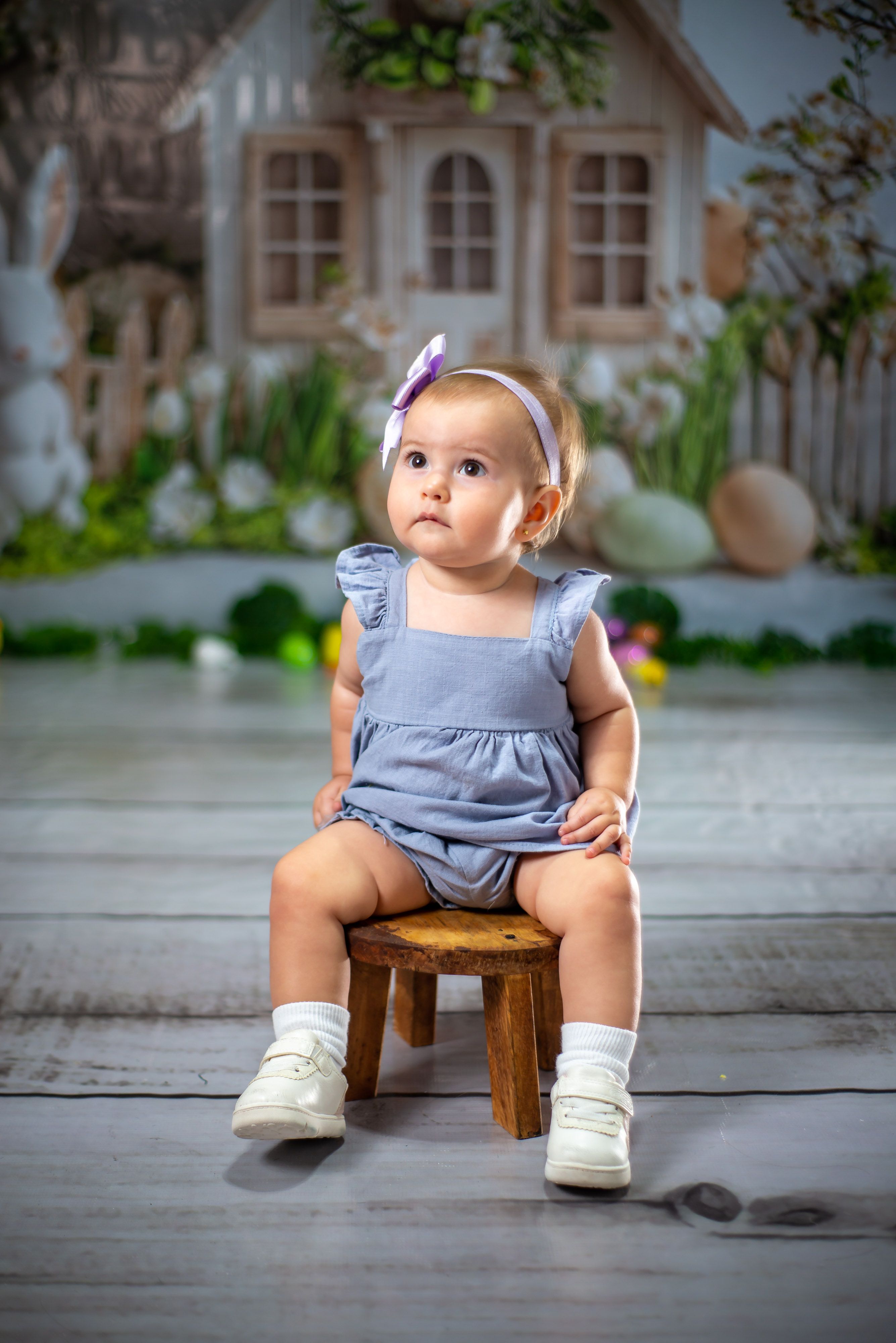 Adorable Baby Girl in Pastel Nursery Setting · Free Stock Photo