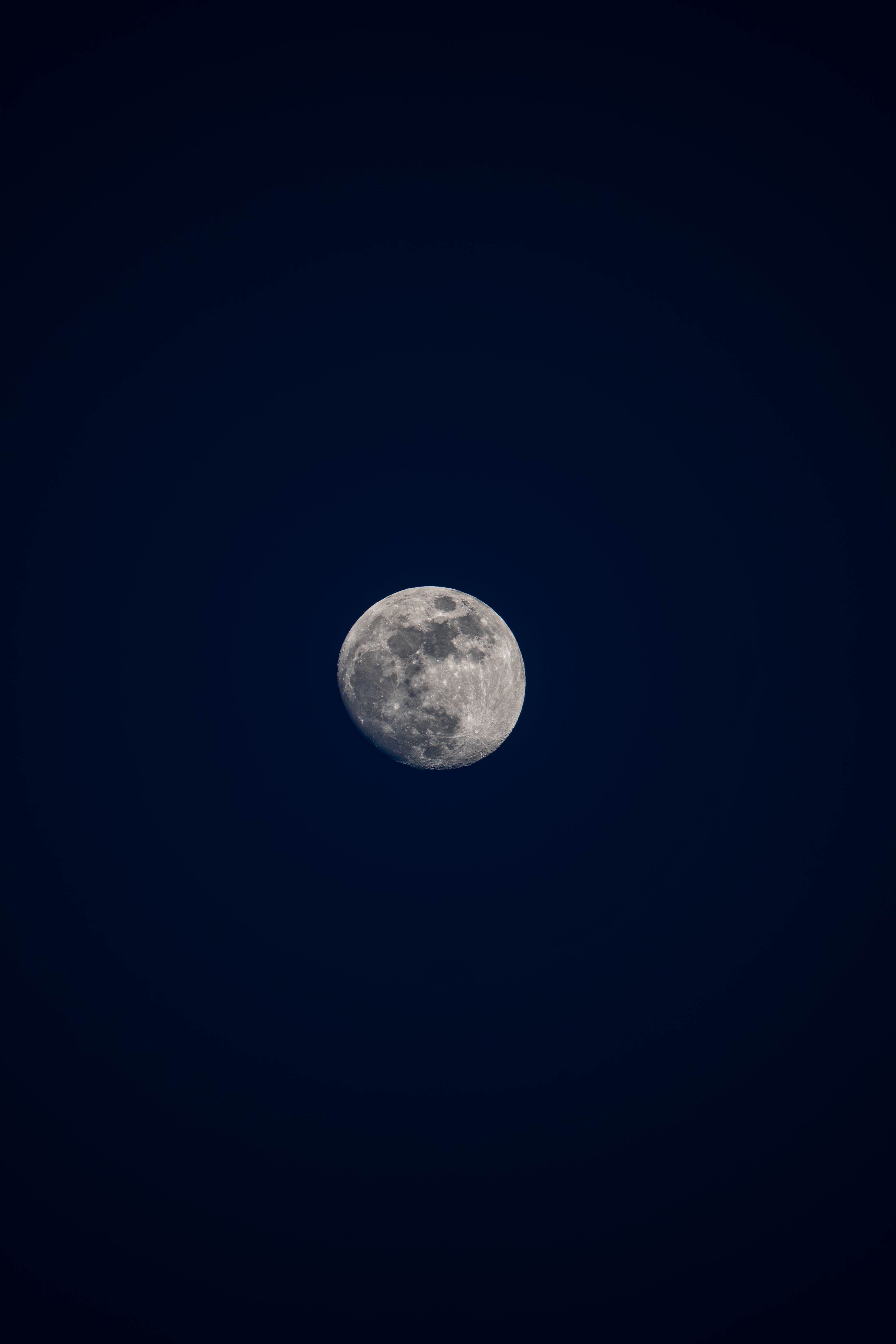 Stunning Full Moon Against a Deep Blue Sky · Free Stock Photo