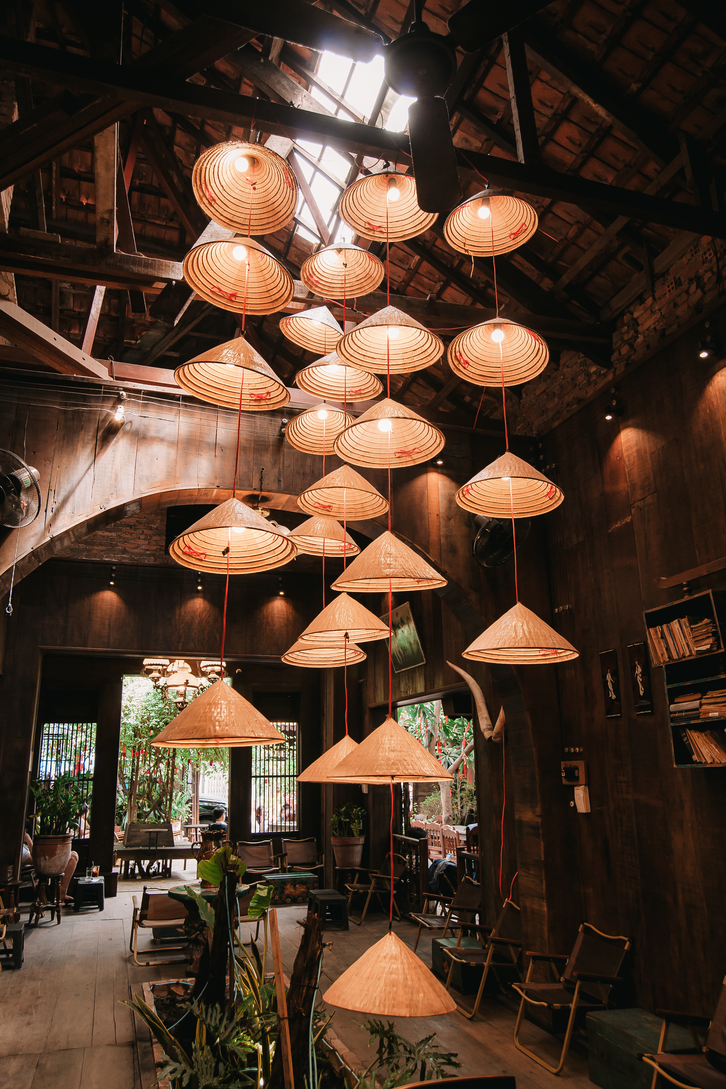 Elegant Vietnamese Coffee Shop Interior with Lanterns · Free Stock Photo