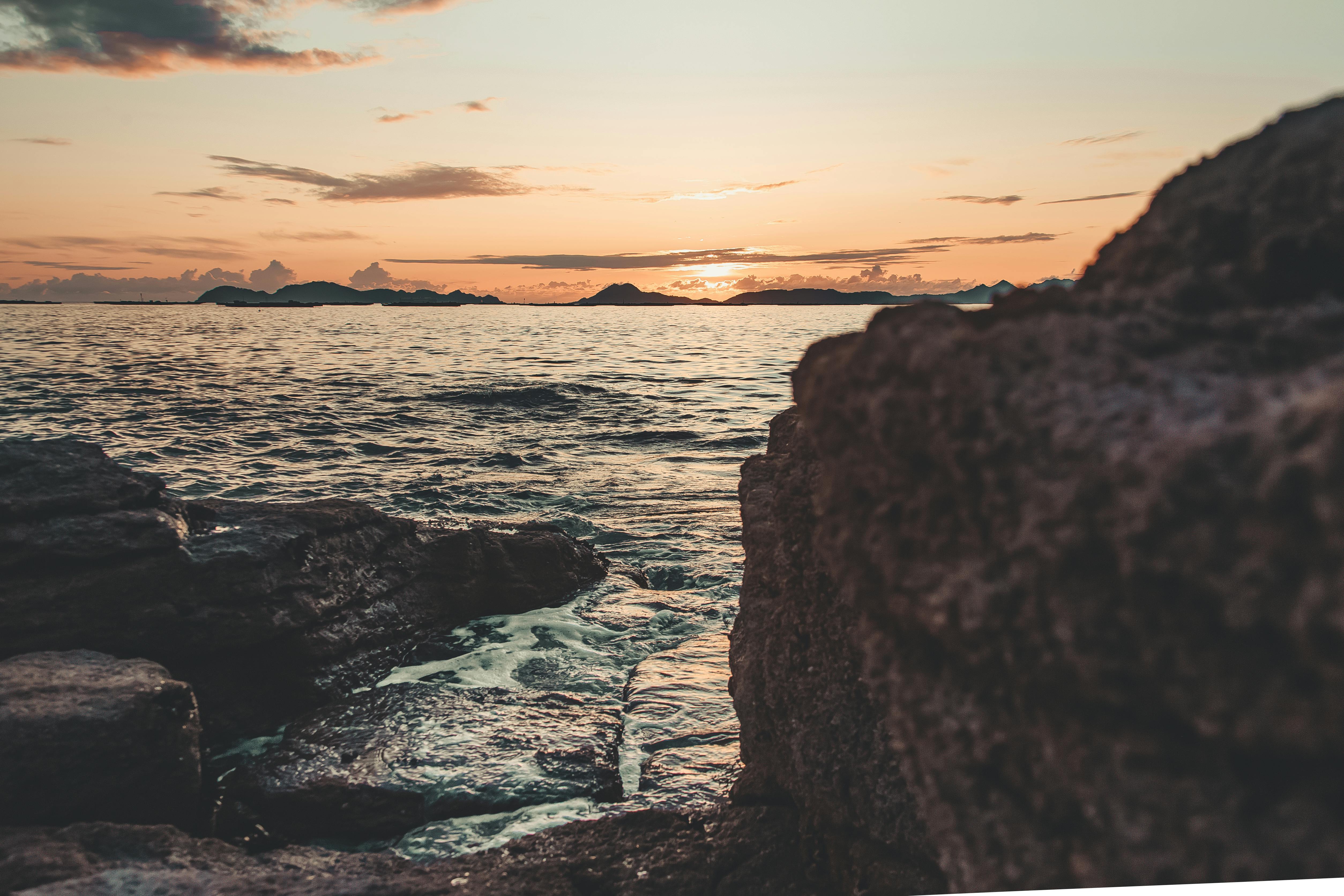 Calm Sea During Golden Hour · Free Stock Photo