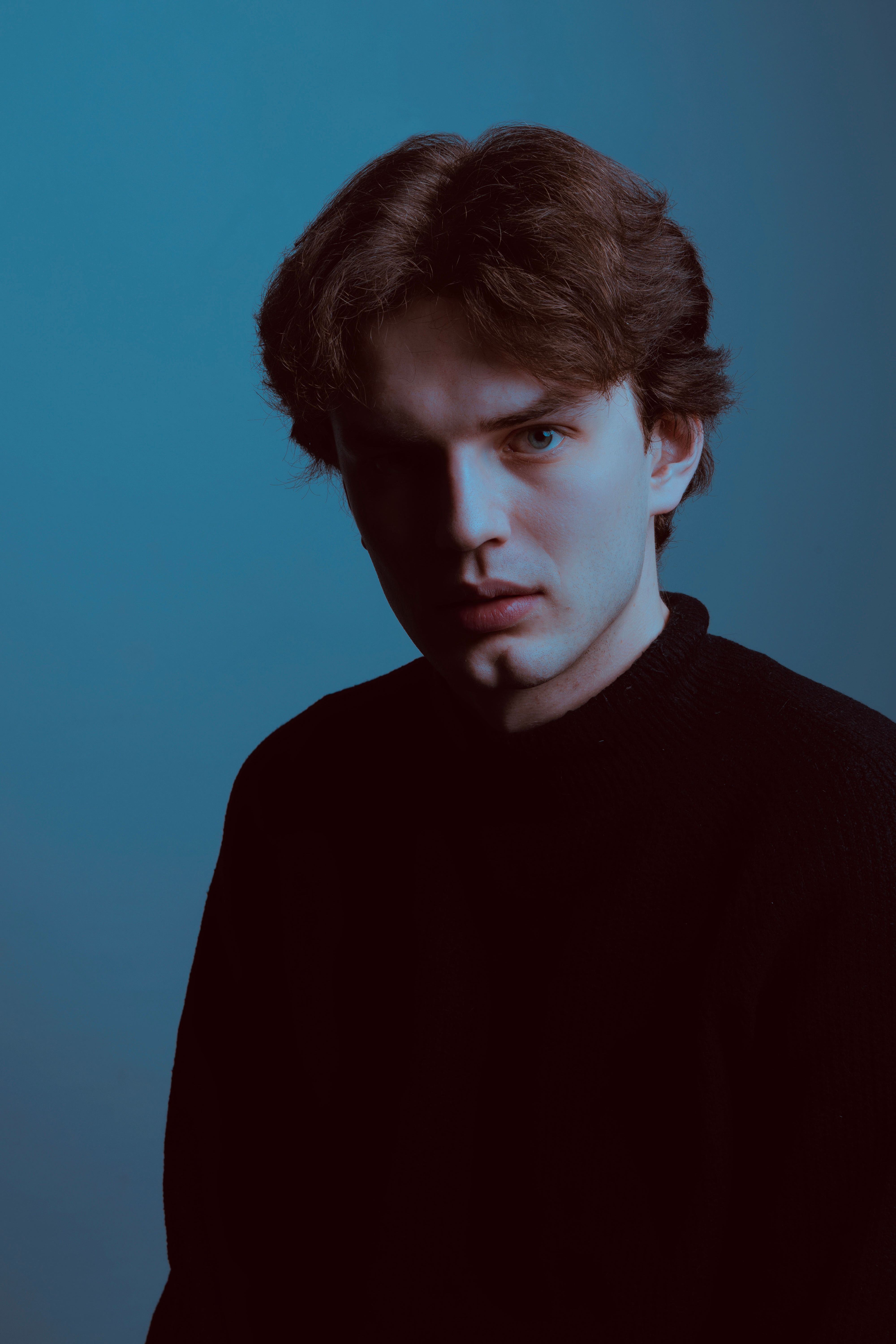 Moody Portrait of Man in Low Key Lighting · Free Stock Photo