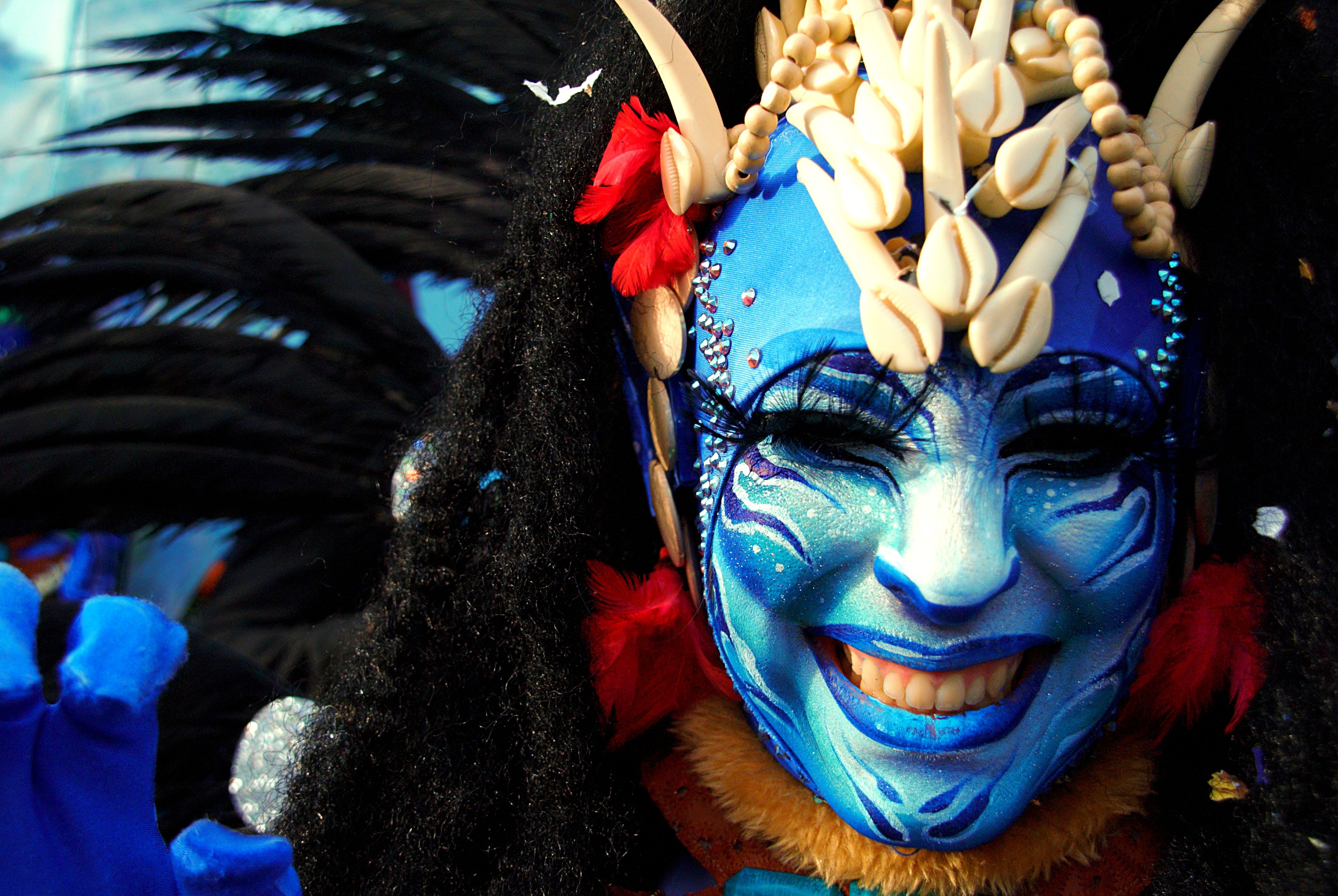 Colorful Carnival Costume with Blue Face Paint · Free Stock Photo