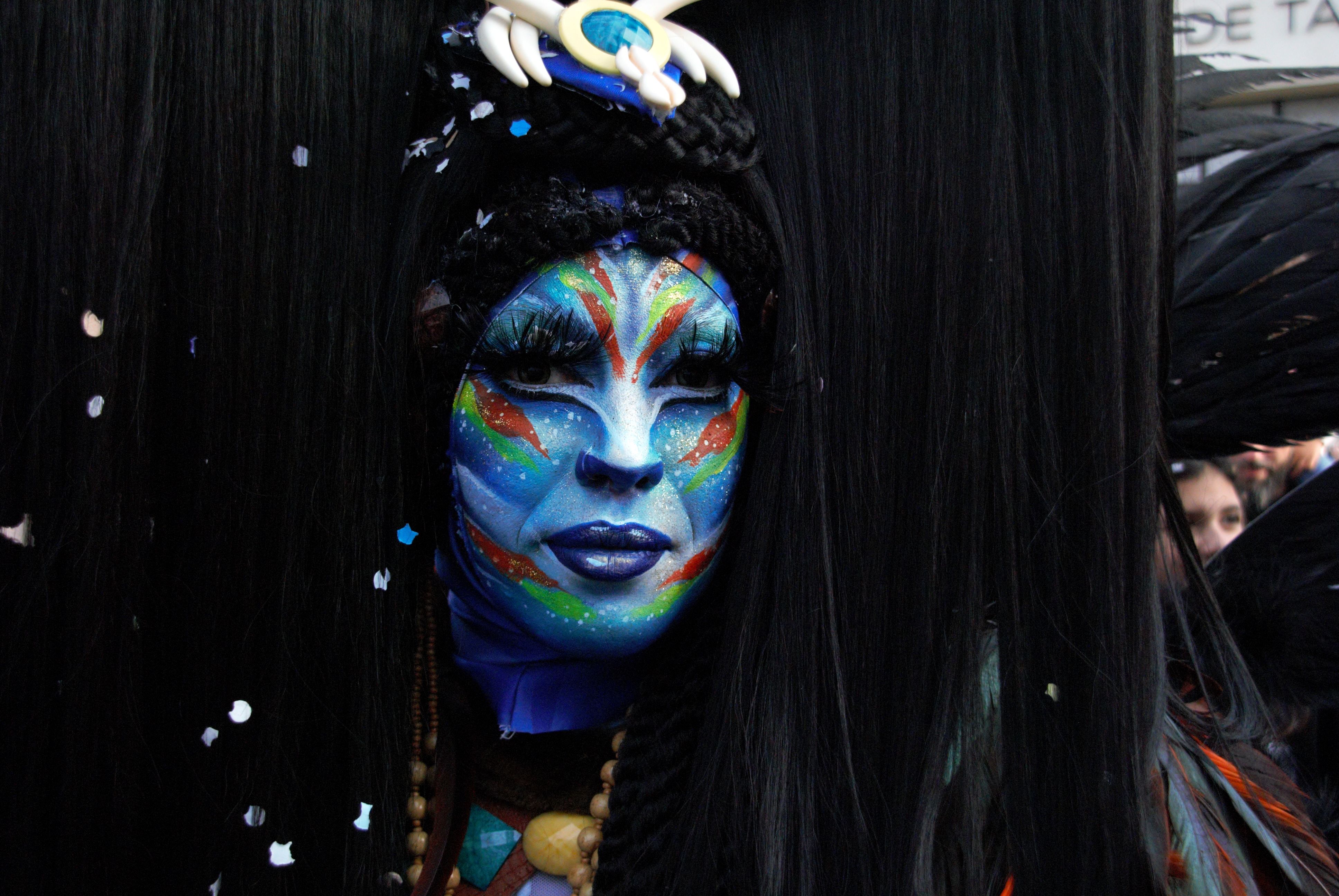 Colorful Carnival Portrait with Masked Performer · Free Stock Photo