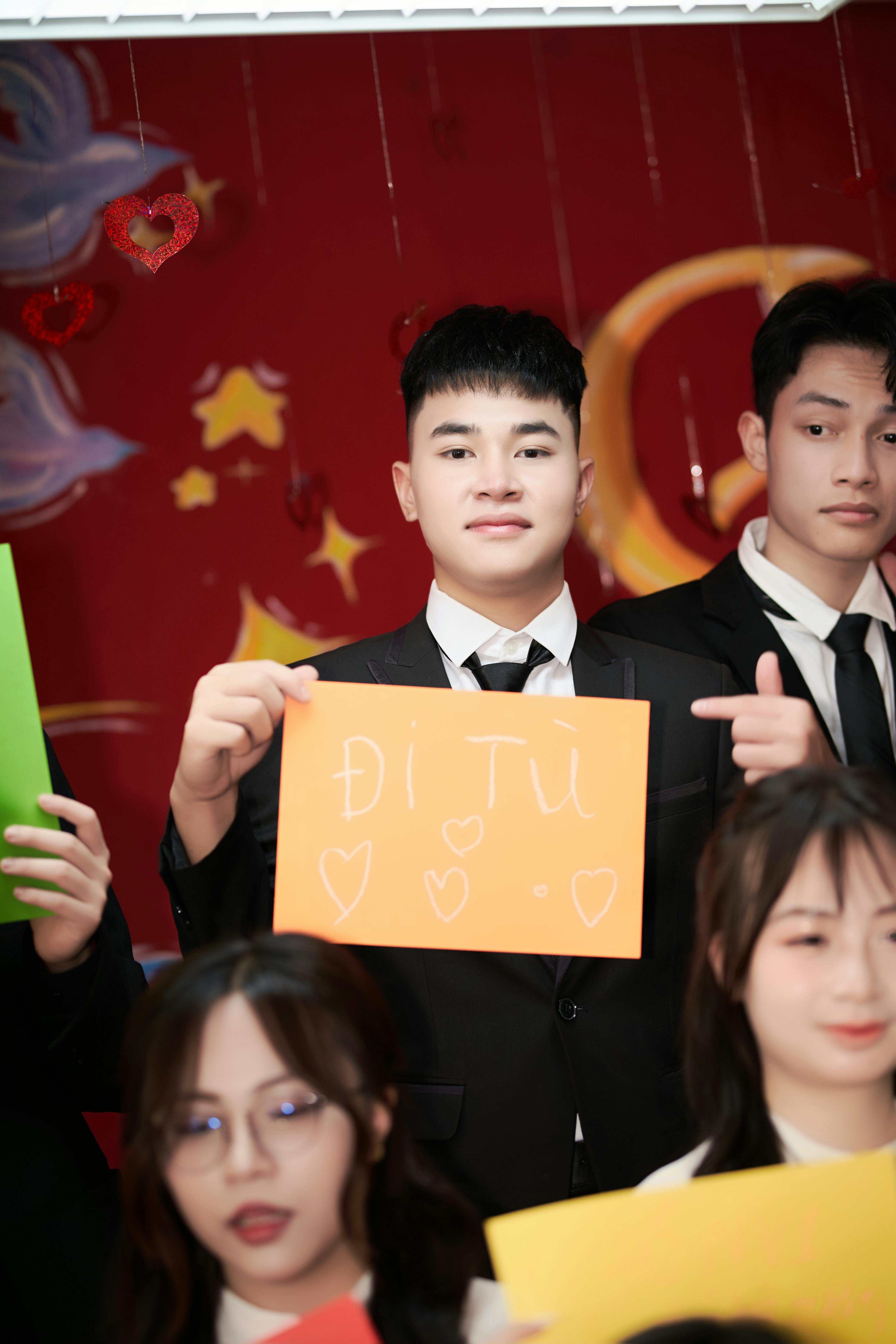 Formal Celebration with Group Holding Signs · Free Stock Photo