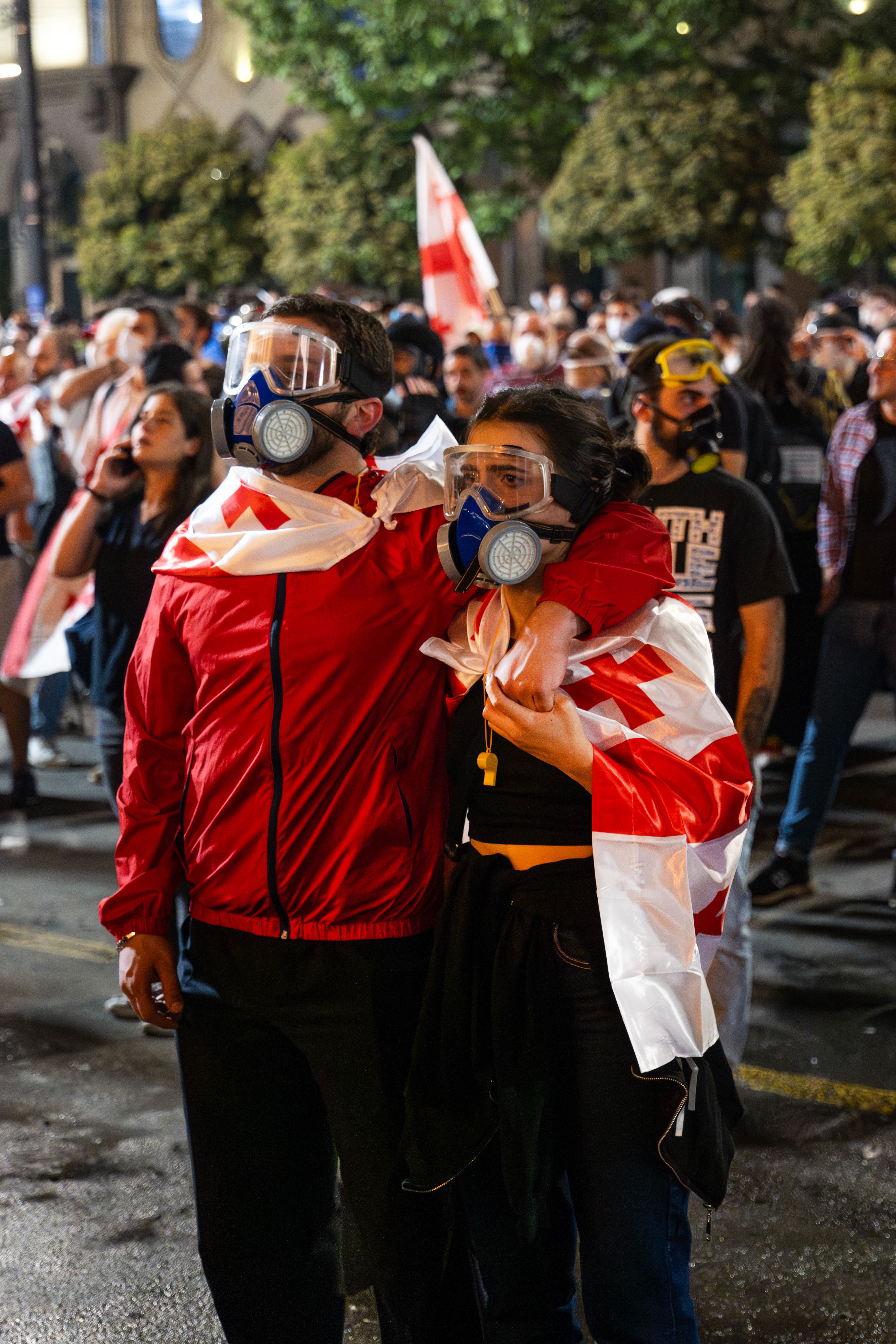 Protest in Tbilisi Featuring Gas Masked Attendees · Free Stock Photo