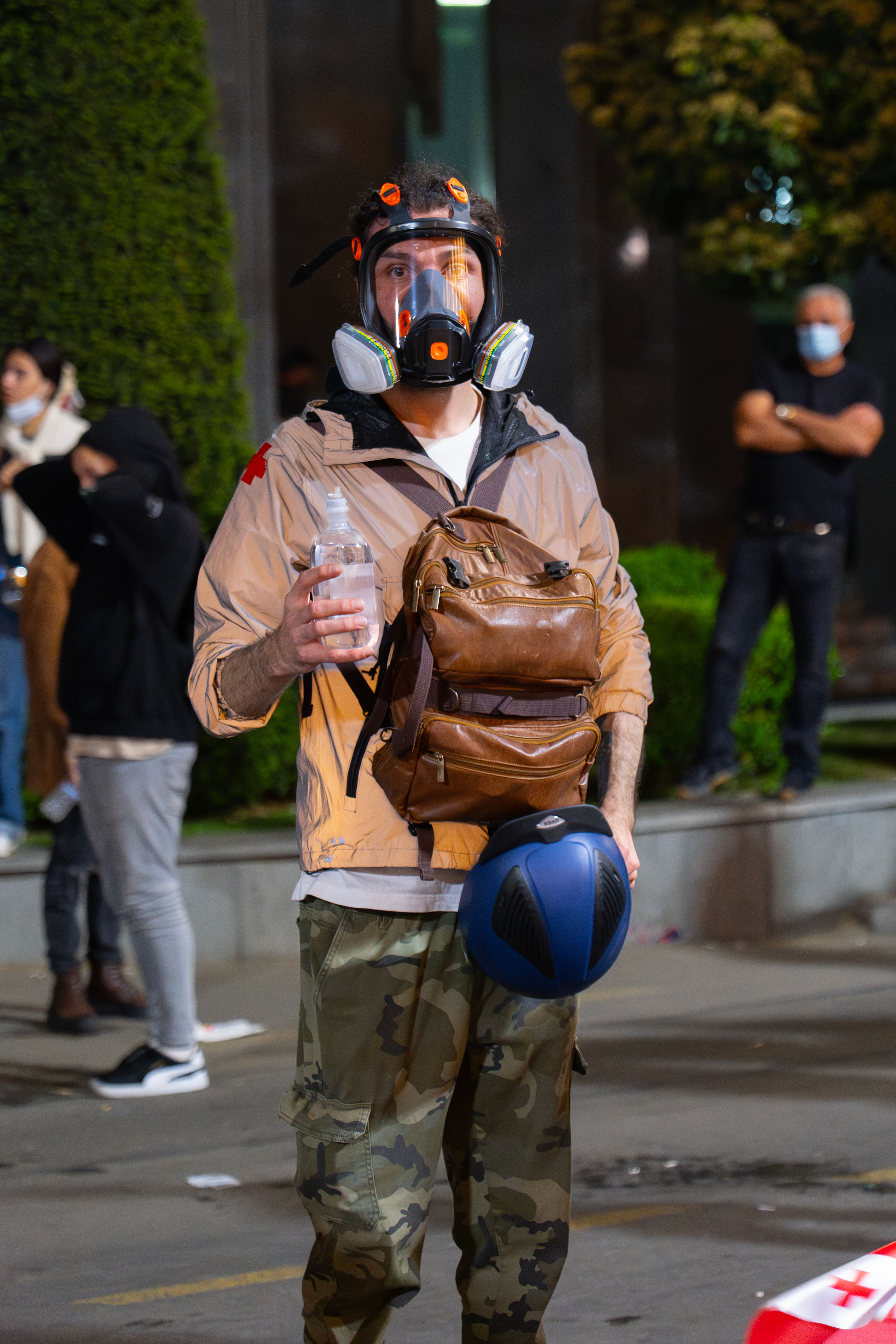 Protester in Gas Mask during Tbilisi Demonstration · Free Stock Photo
