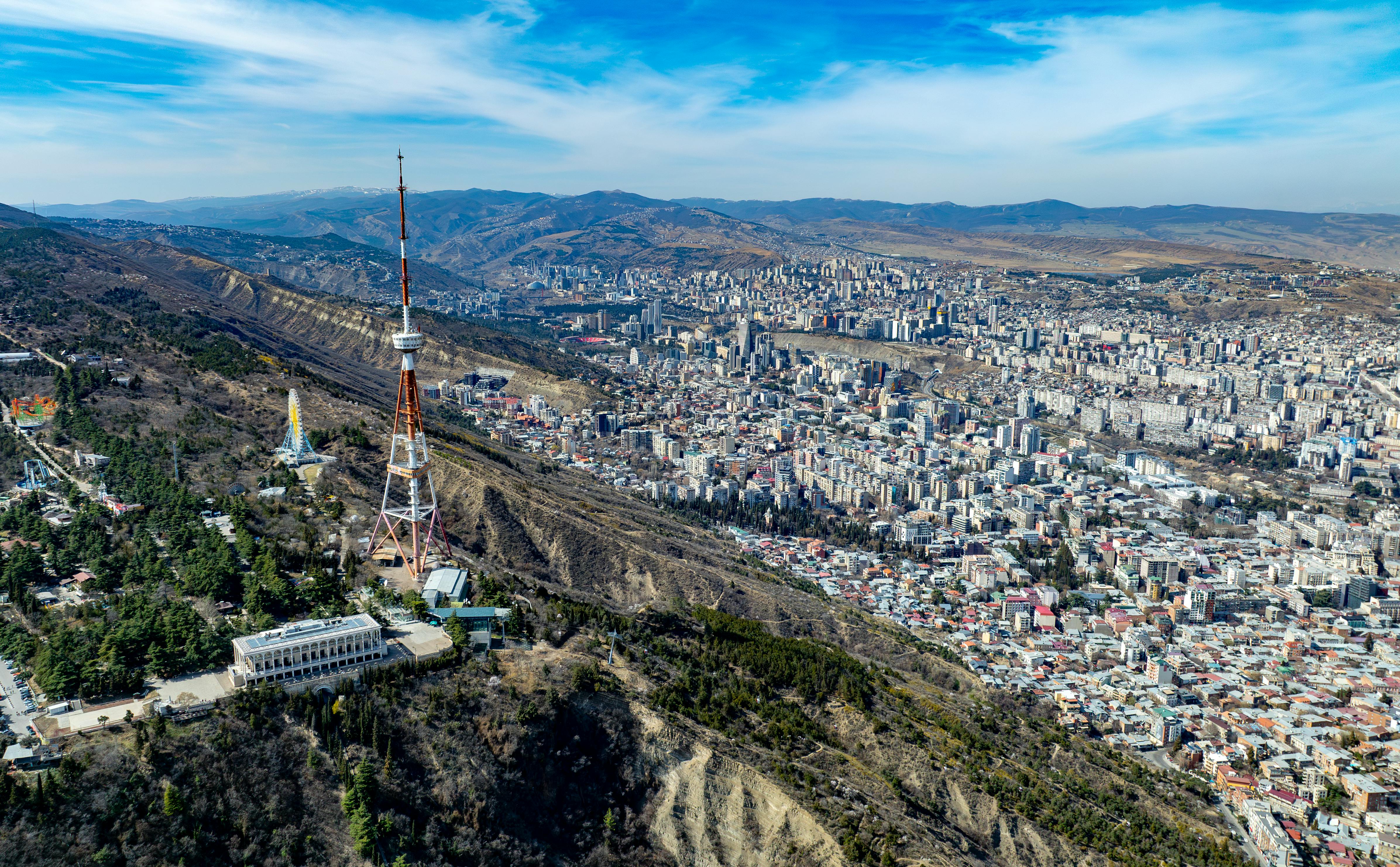 Aerial View of Tbilisi Featuring Mtatsminda Tower · Free Stock Photo