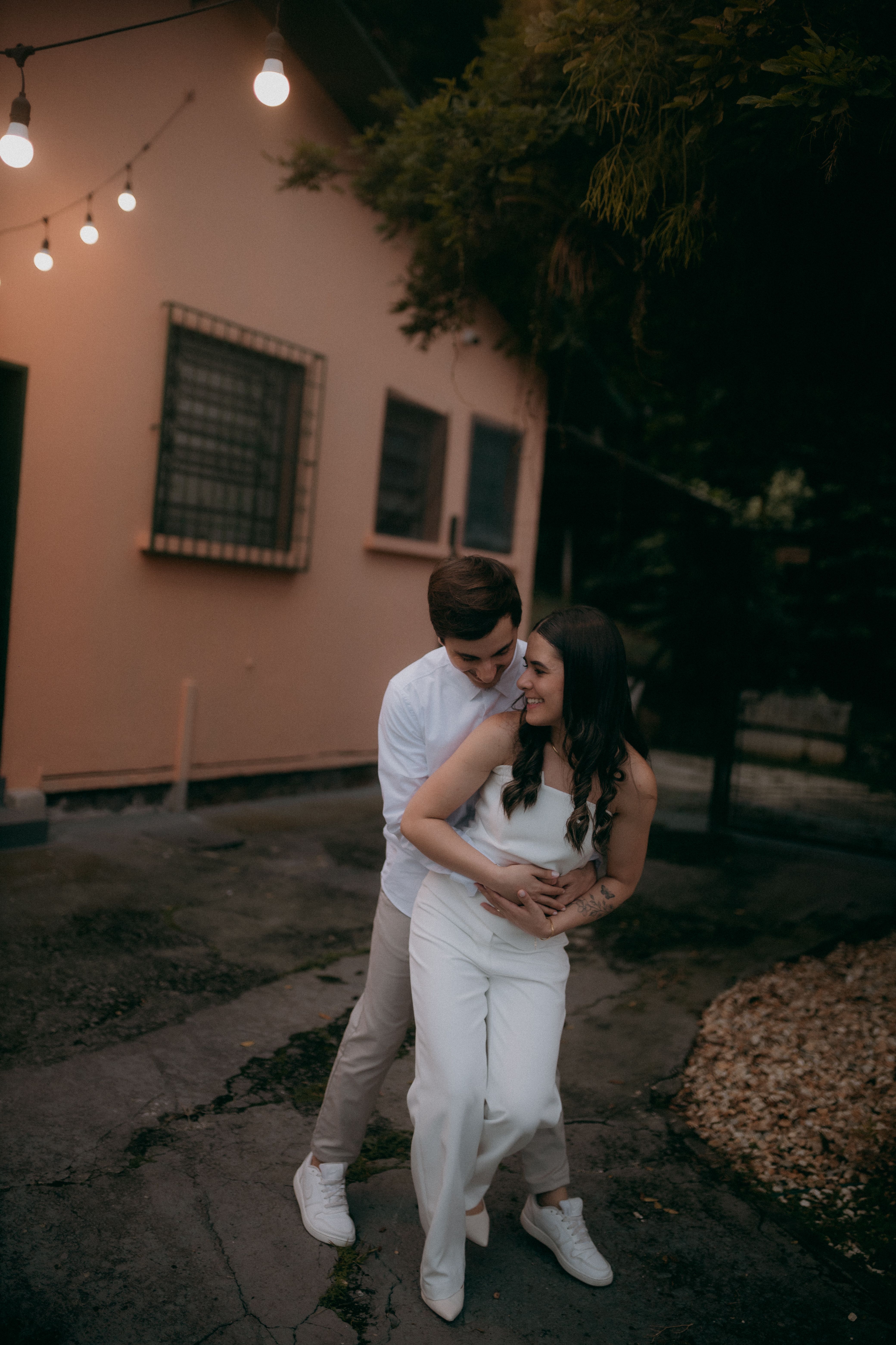 Romantic Couple Embracing Outdoors at Night · Free Stock Photo