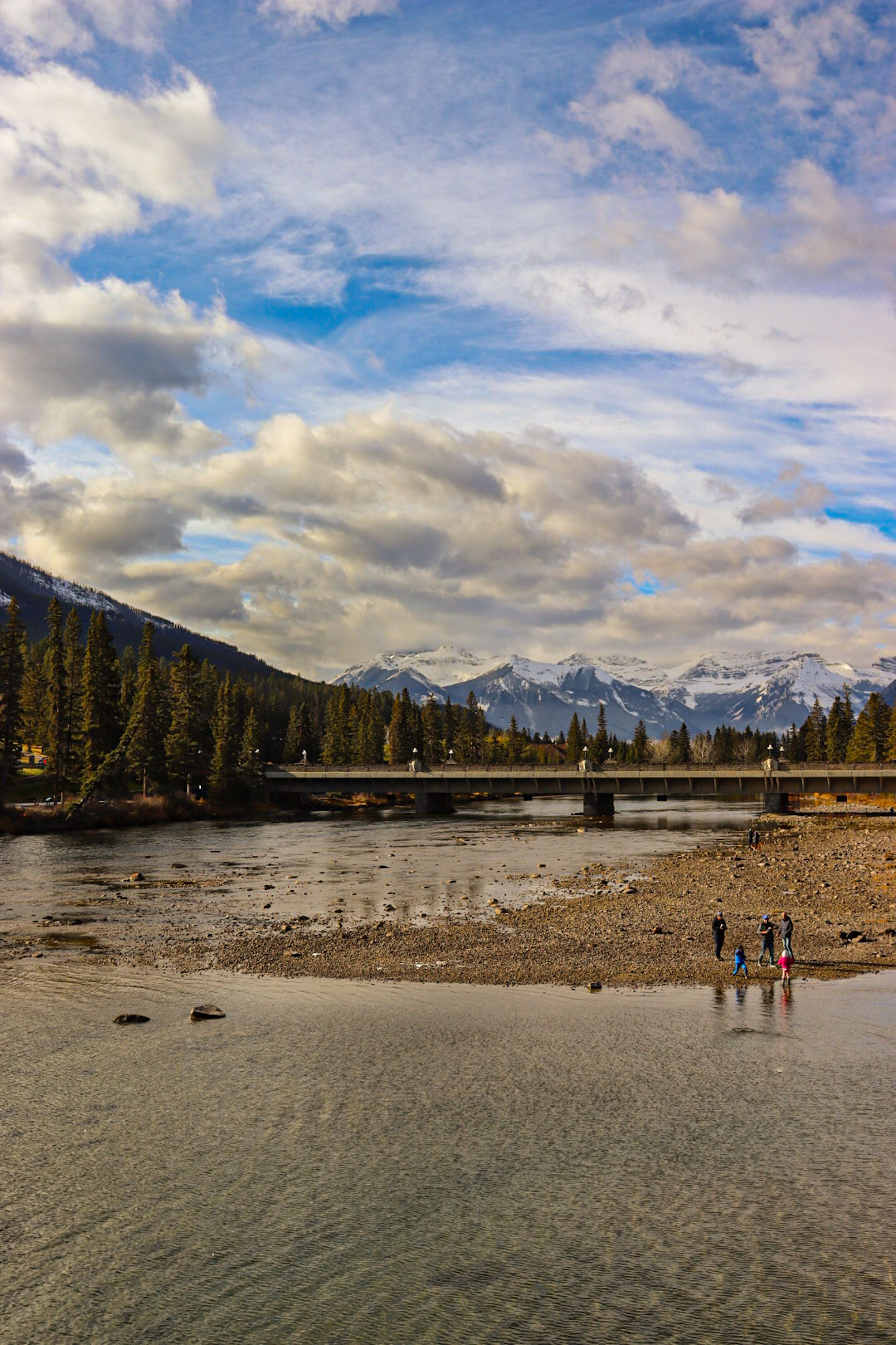 Scenic Mountain River Landscape with Bridge · Free Stock Photo