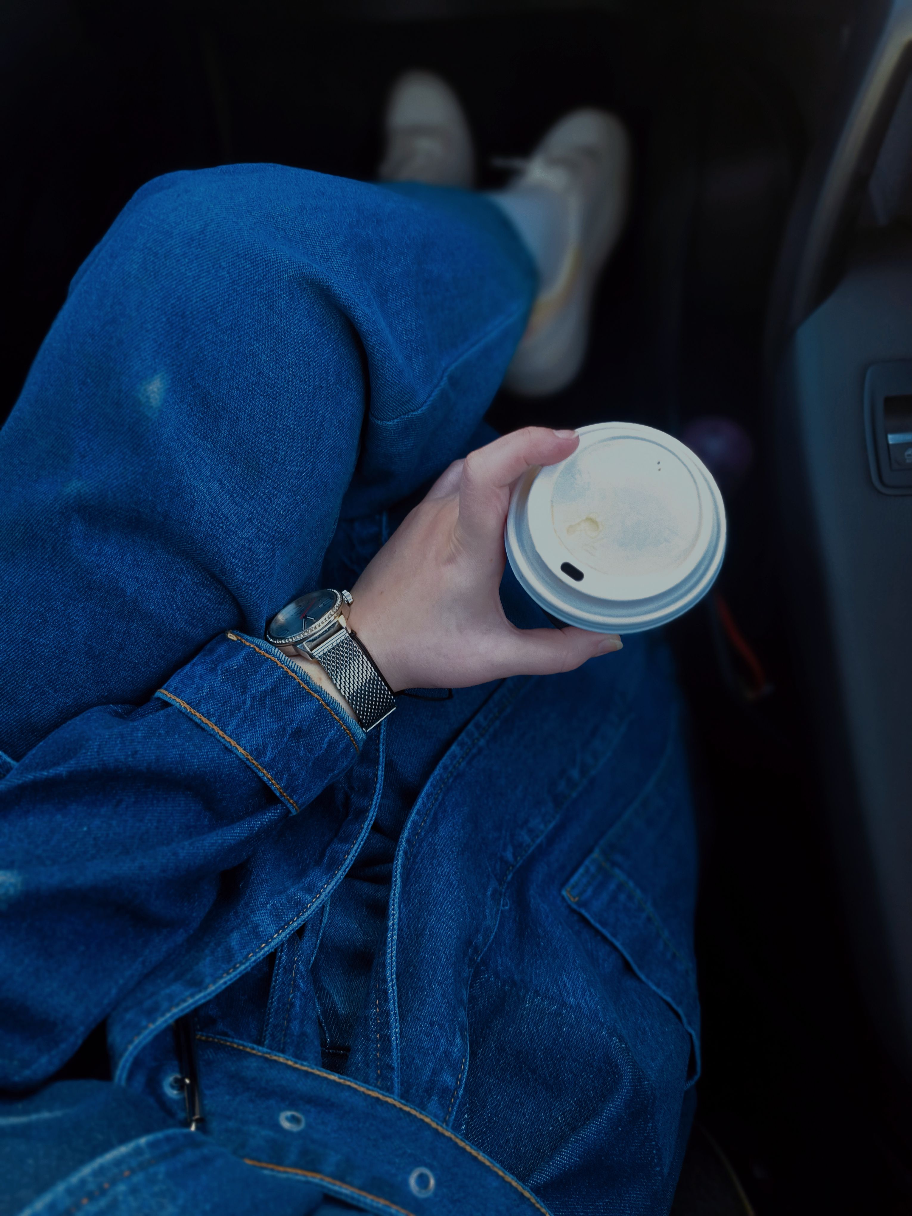 Enjoying Coffee in Denim on a Drive · Free Stock Photo