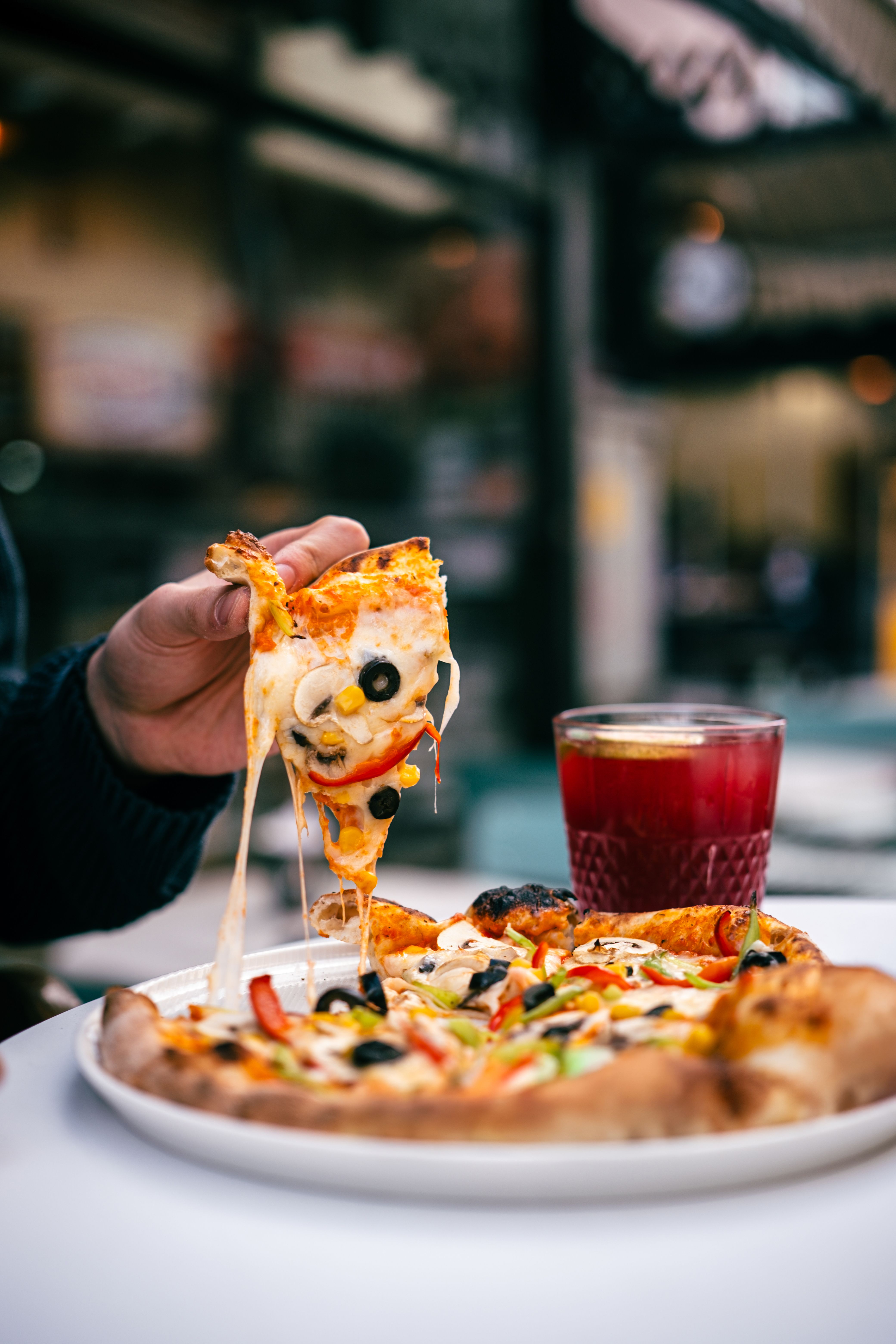 Delicious Pizza Slice with Cheesy Toppings · Free Stock Photo
