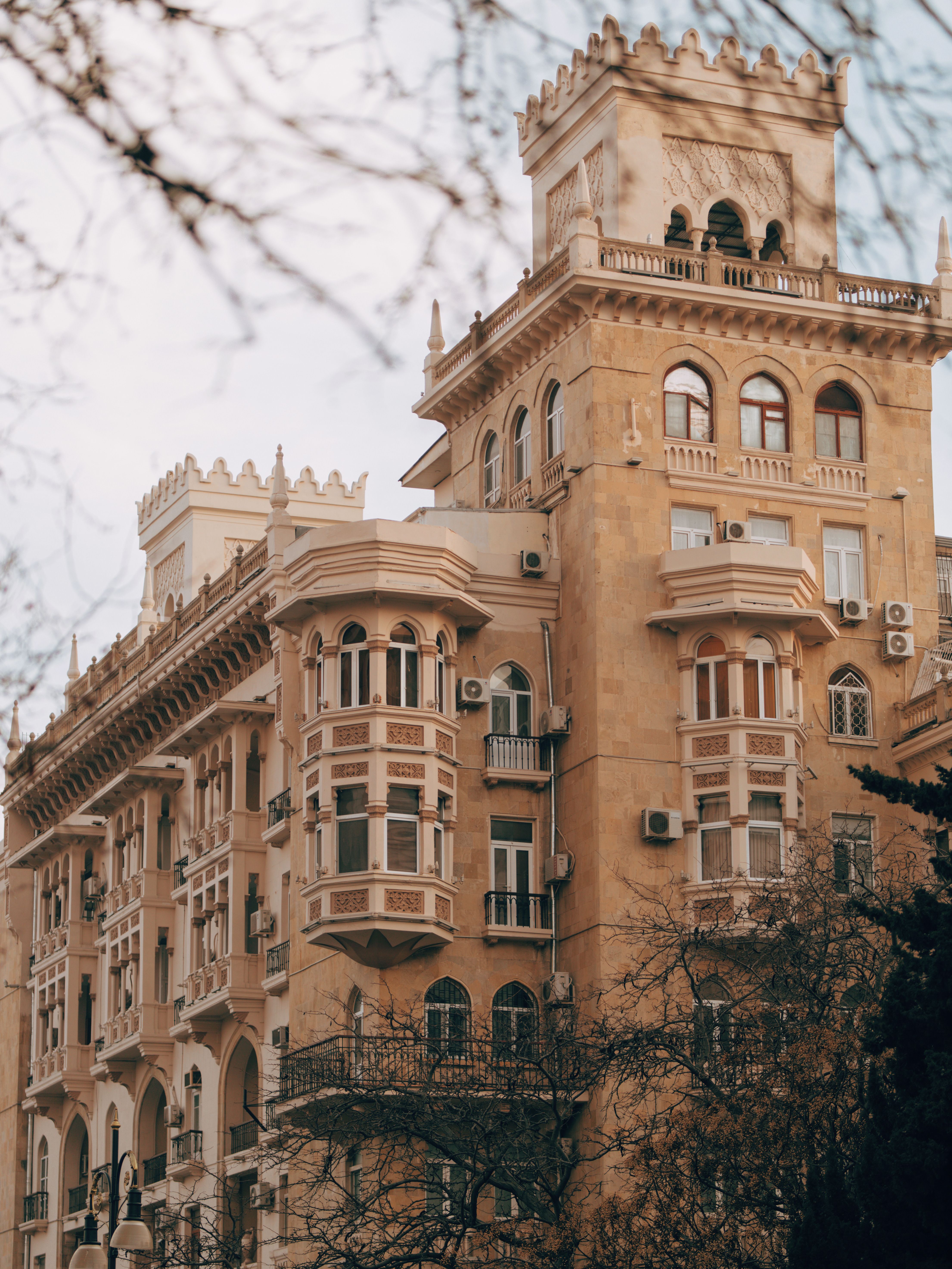 Elegant Historic Building with Gothic Features · Free Stock Photo