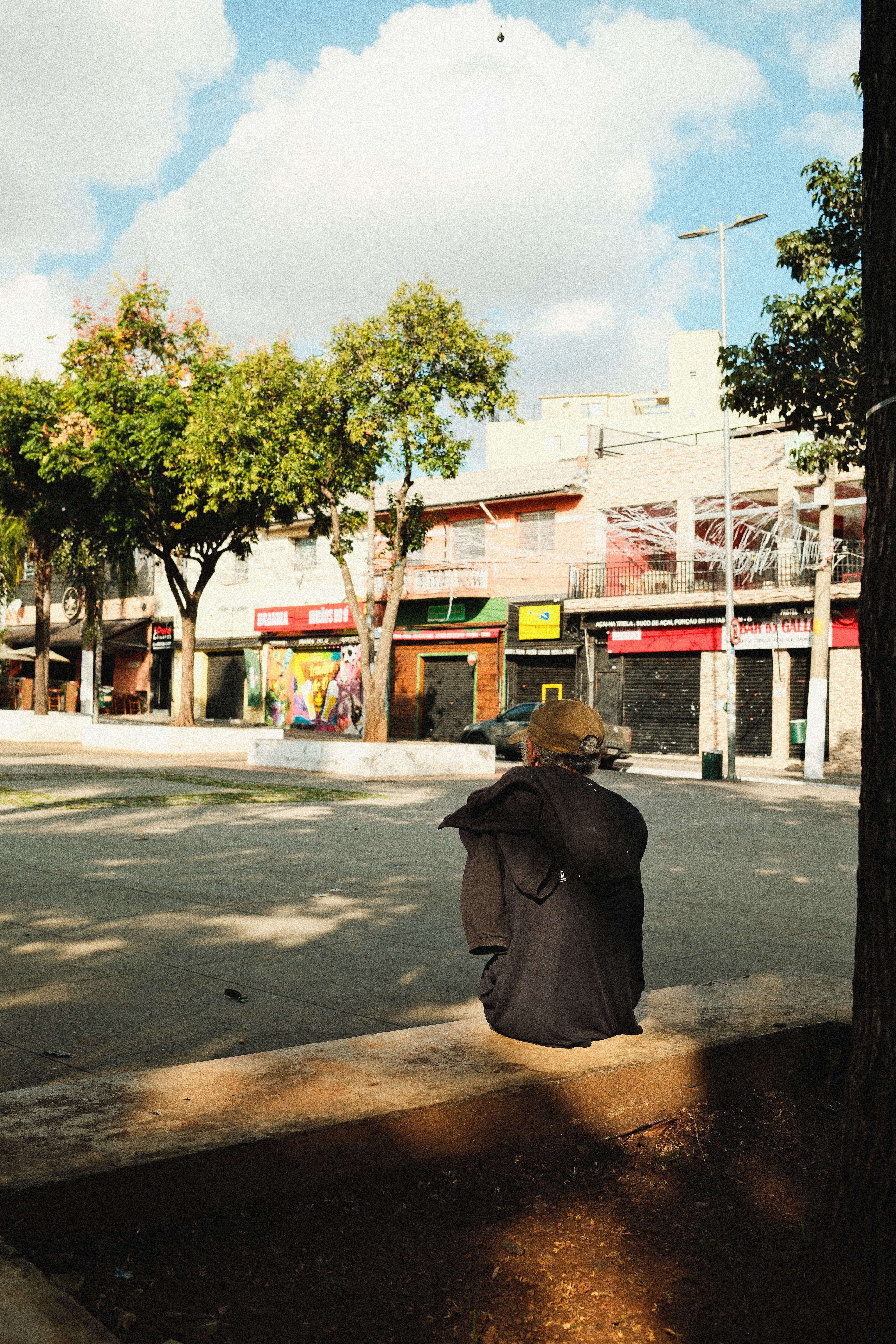 Solitary Figure in Urban Park Setting · Free Stock Photo
