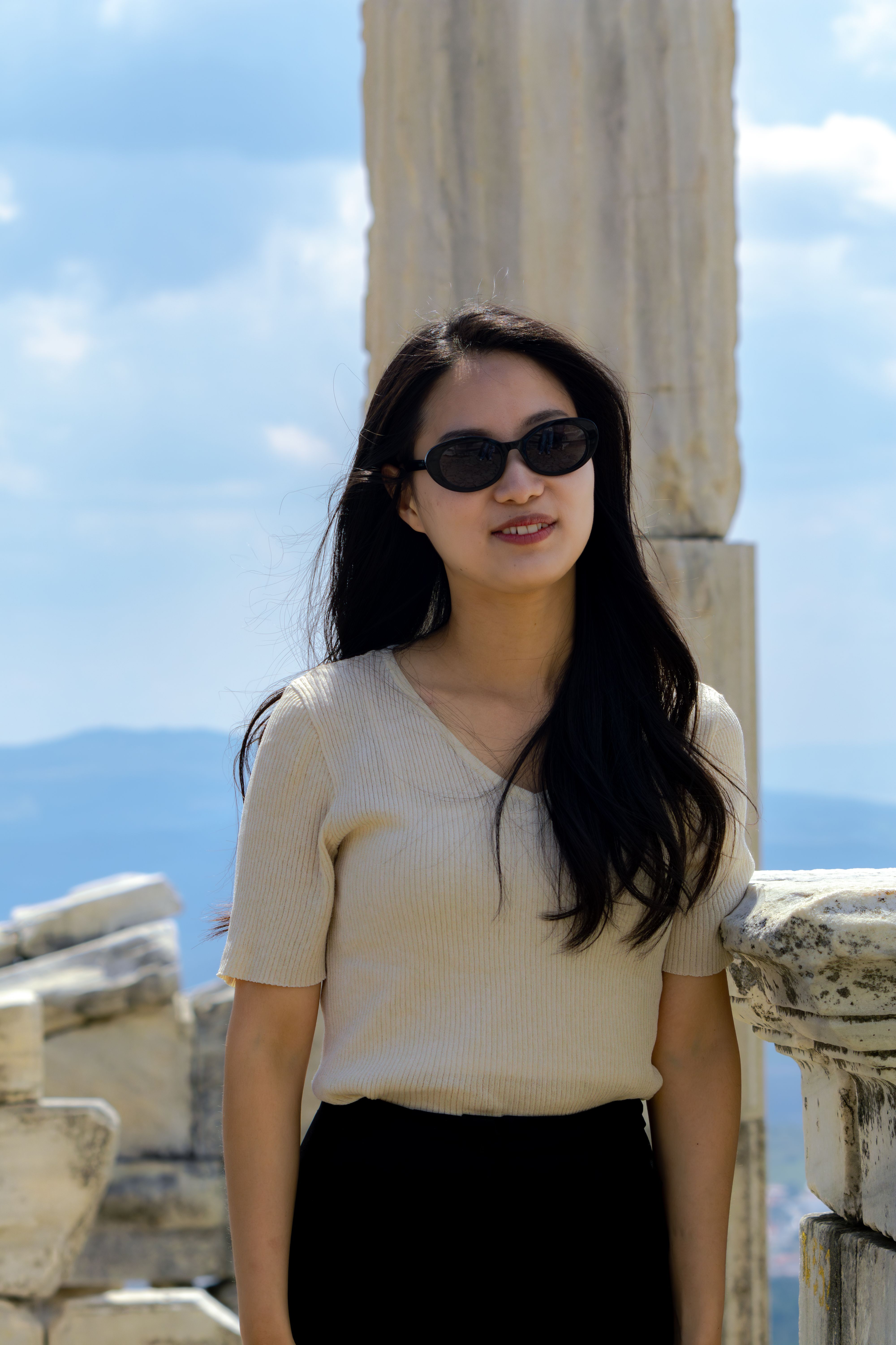 Young Woman Exploring Ancient Pergamon Ruins · Free Stock Photo
