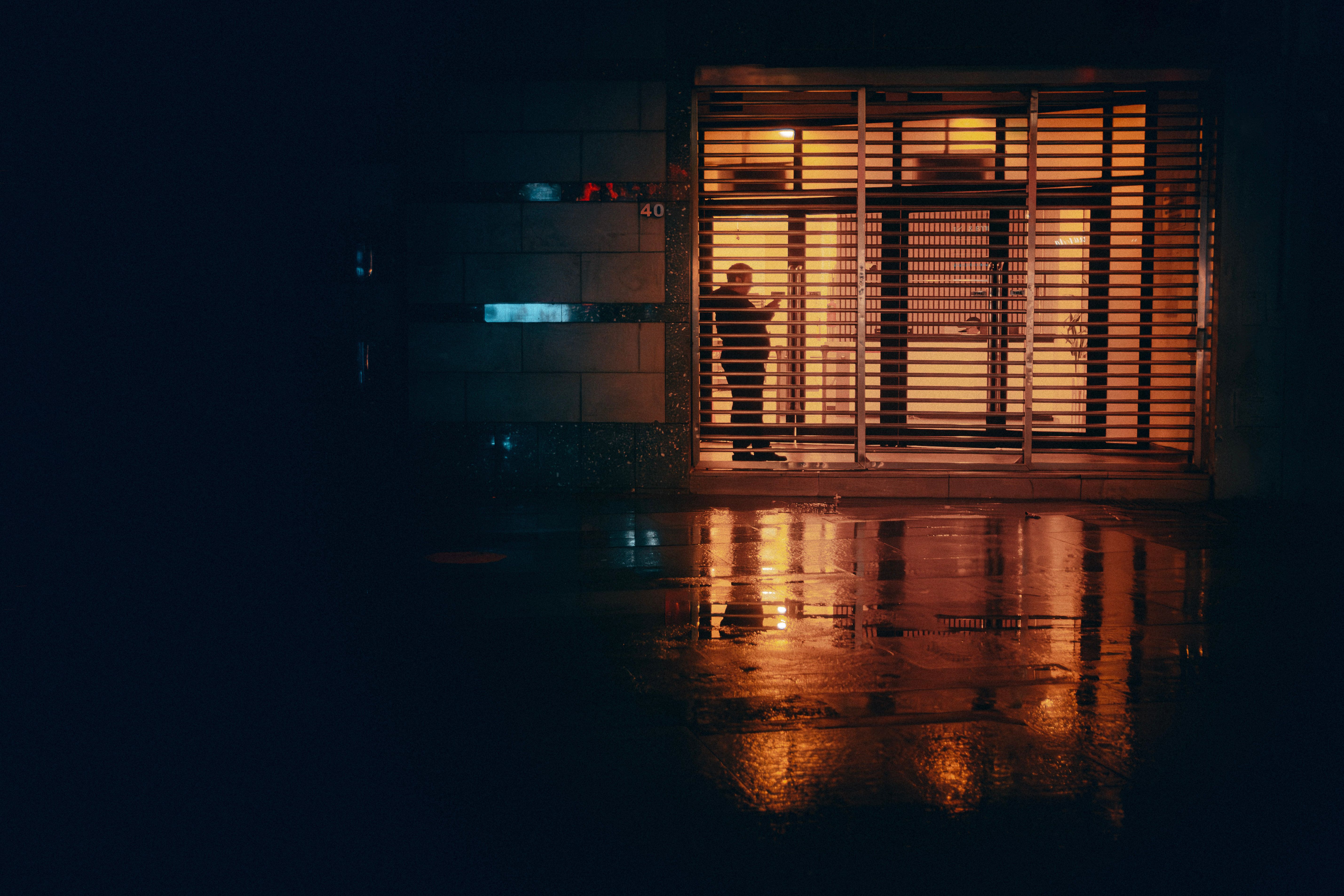 Moody Night Scene with Reflections and Silhouette · Free Stock Photo
