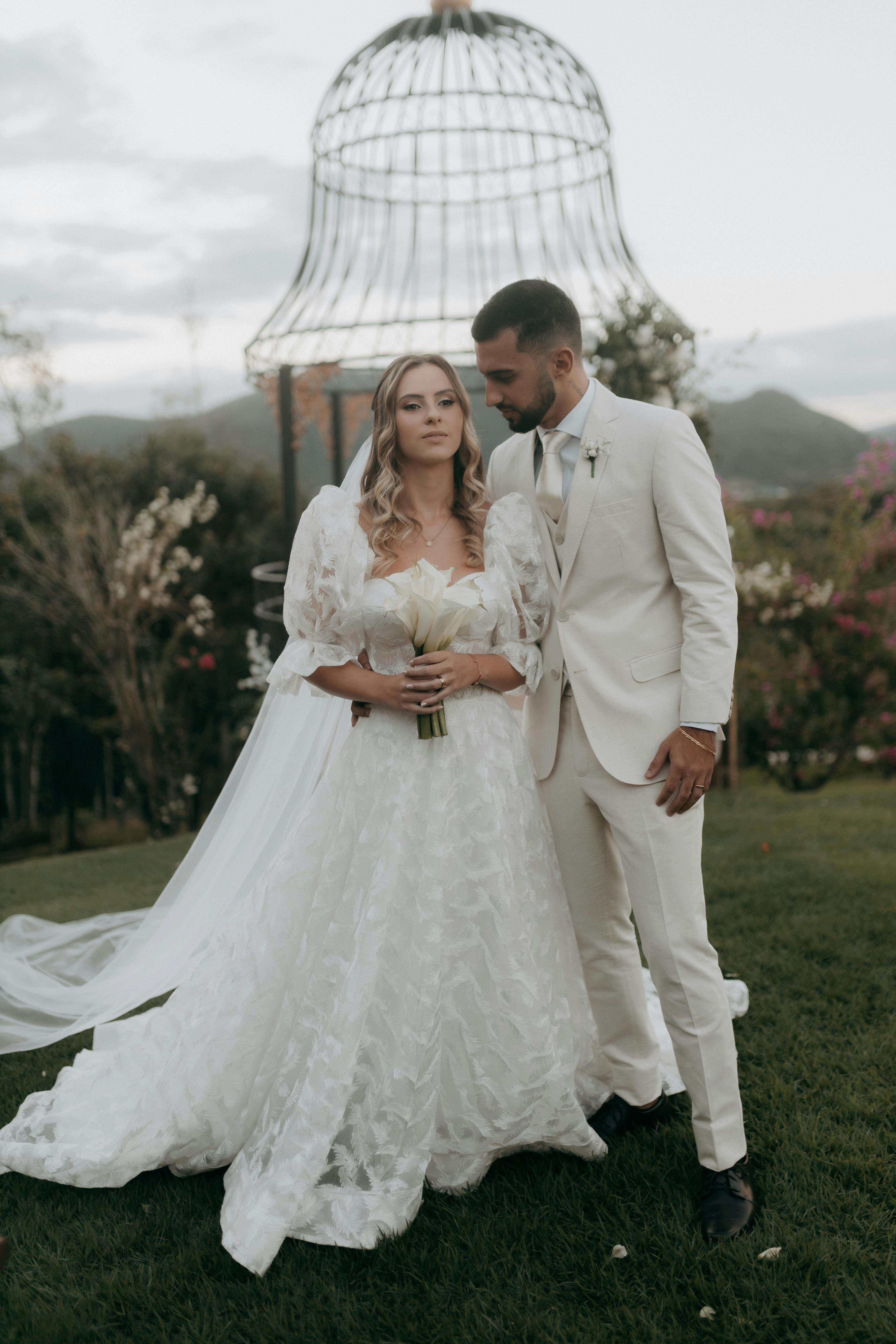 Elegant Outdoor Wedding Portrait with Bride and Groom · Free Stock Photo