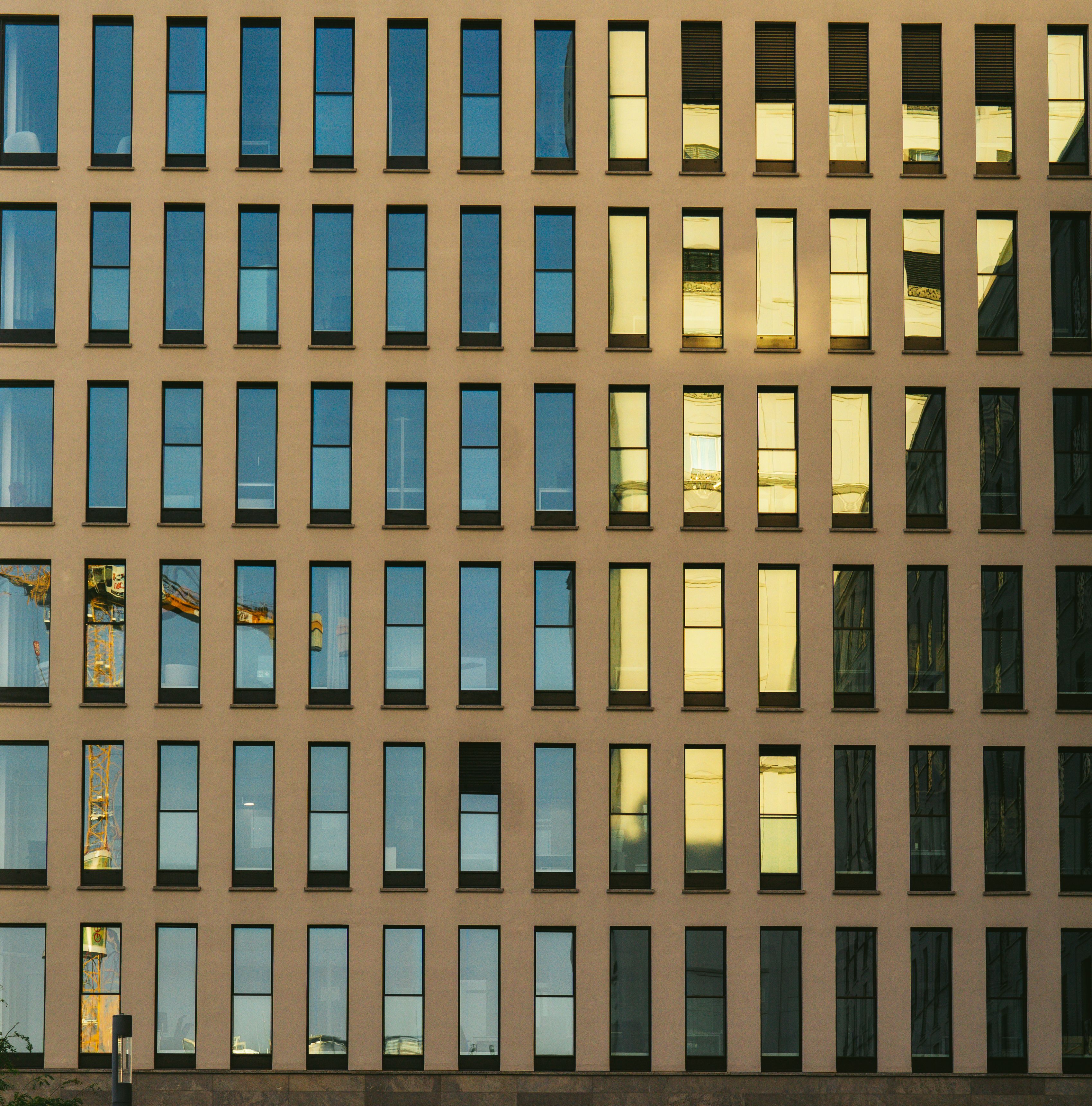 Modern Facade with Reflective Windows · Free Stock Photo
