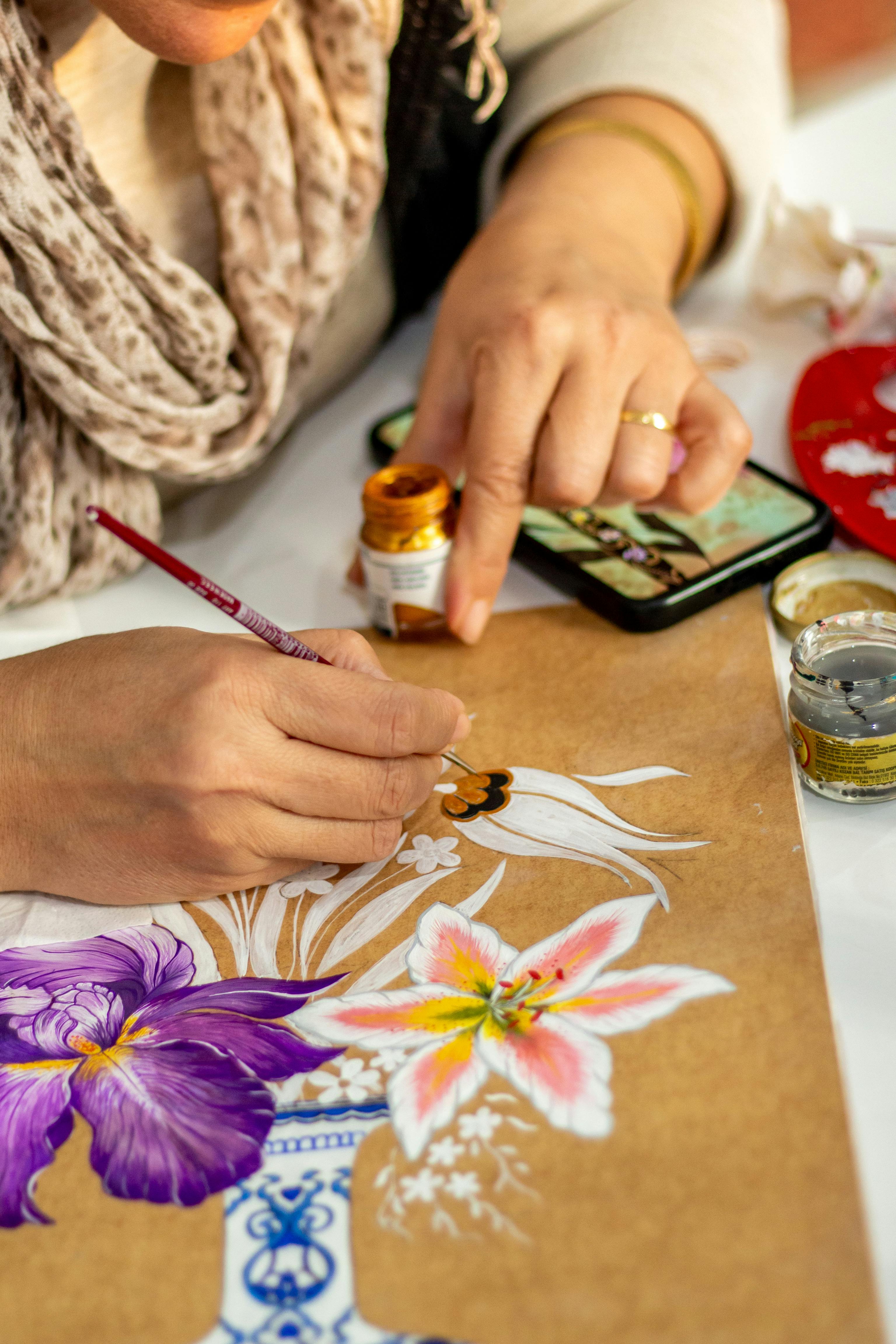 Artistic Hand Painting Intricate Floral Design · Free Stock Photo