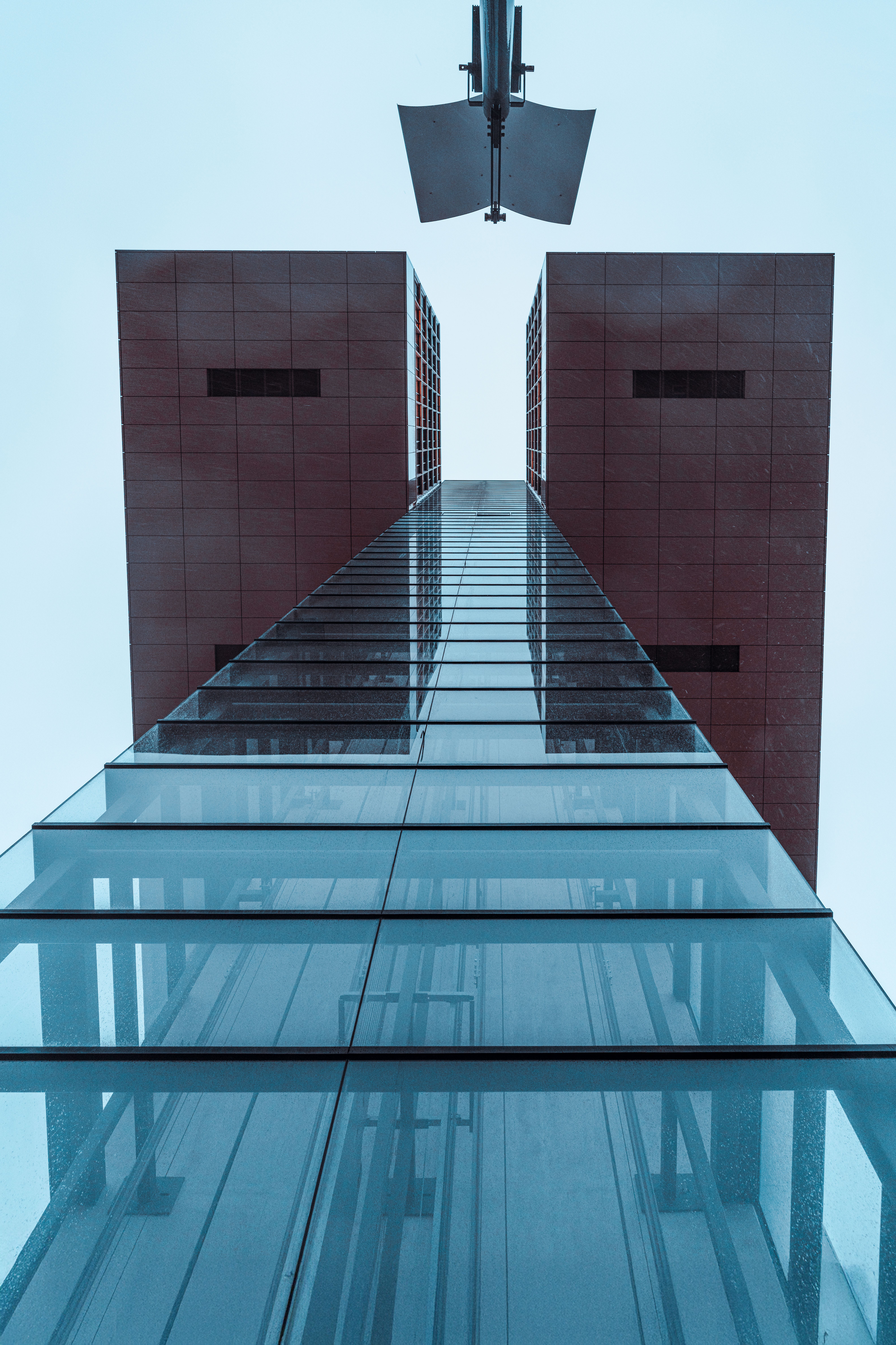 Modern Architectural Tower with Glass Facade · Free Stock Photo