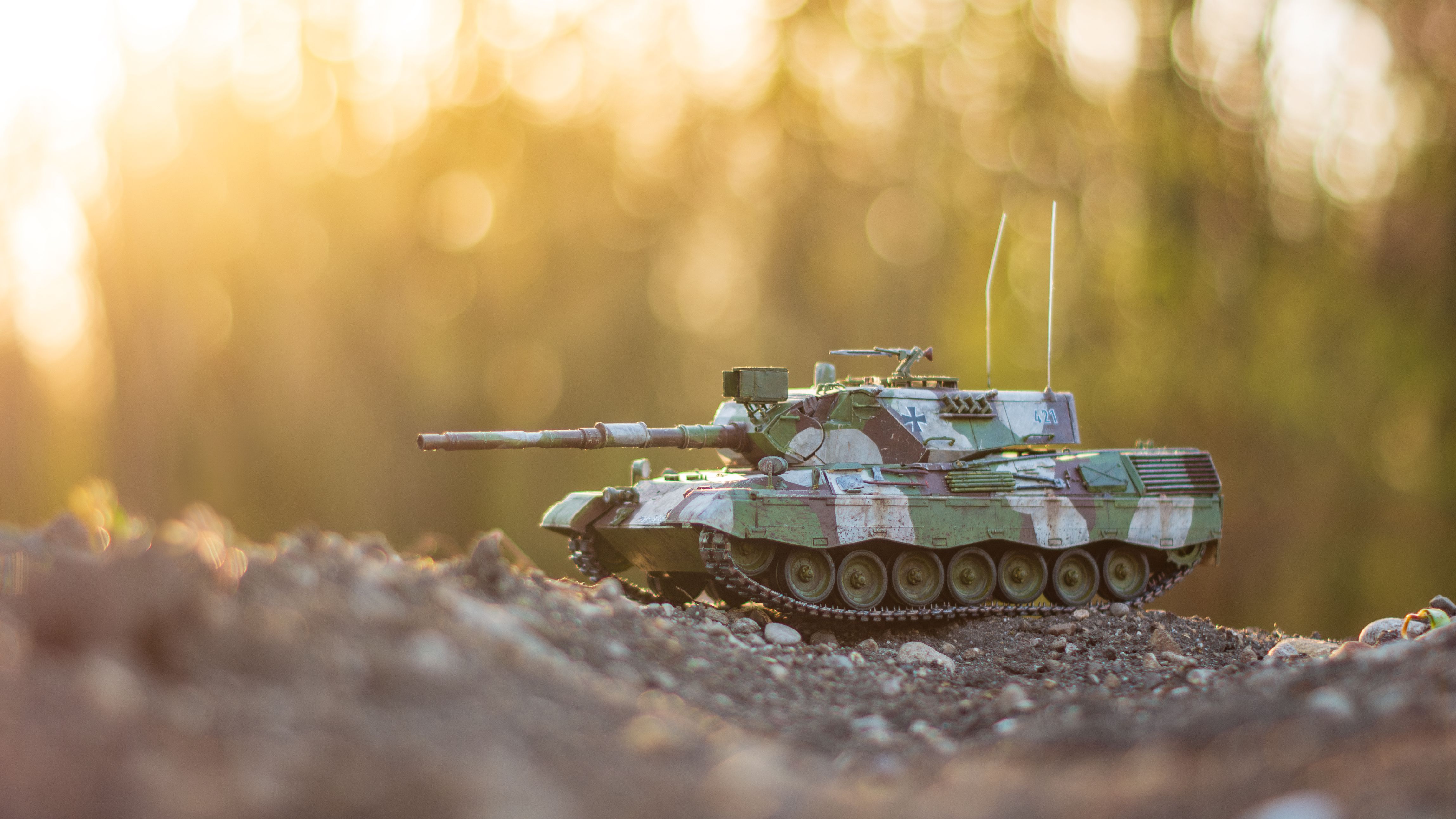 Model Tank on Terrain at Golden Hour · Free Stock Photo