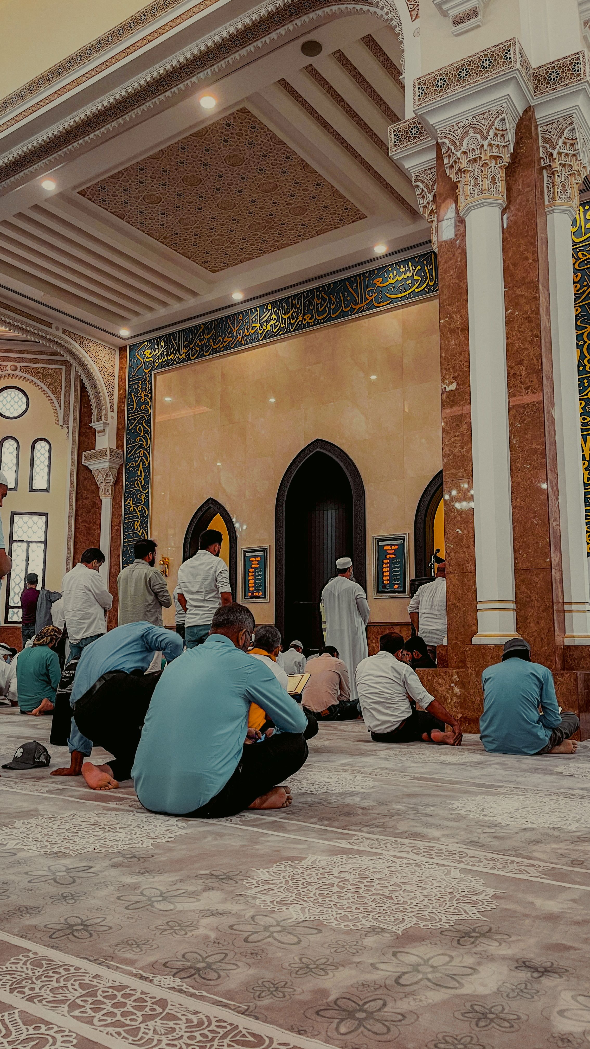 Men Praying in a Grand Mosque Interior · Free Stock Photo